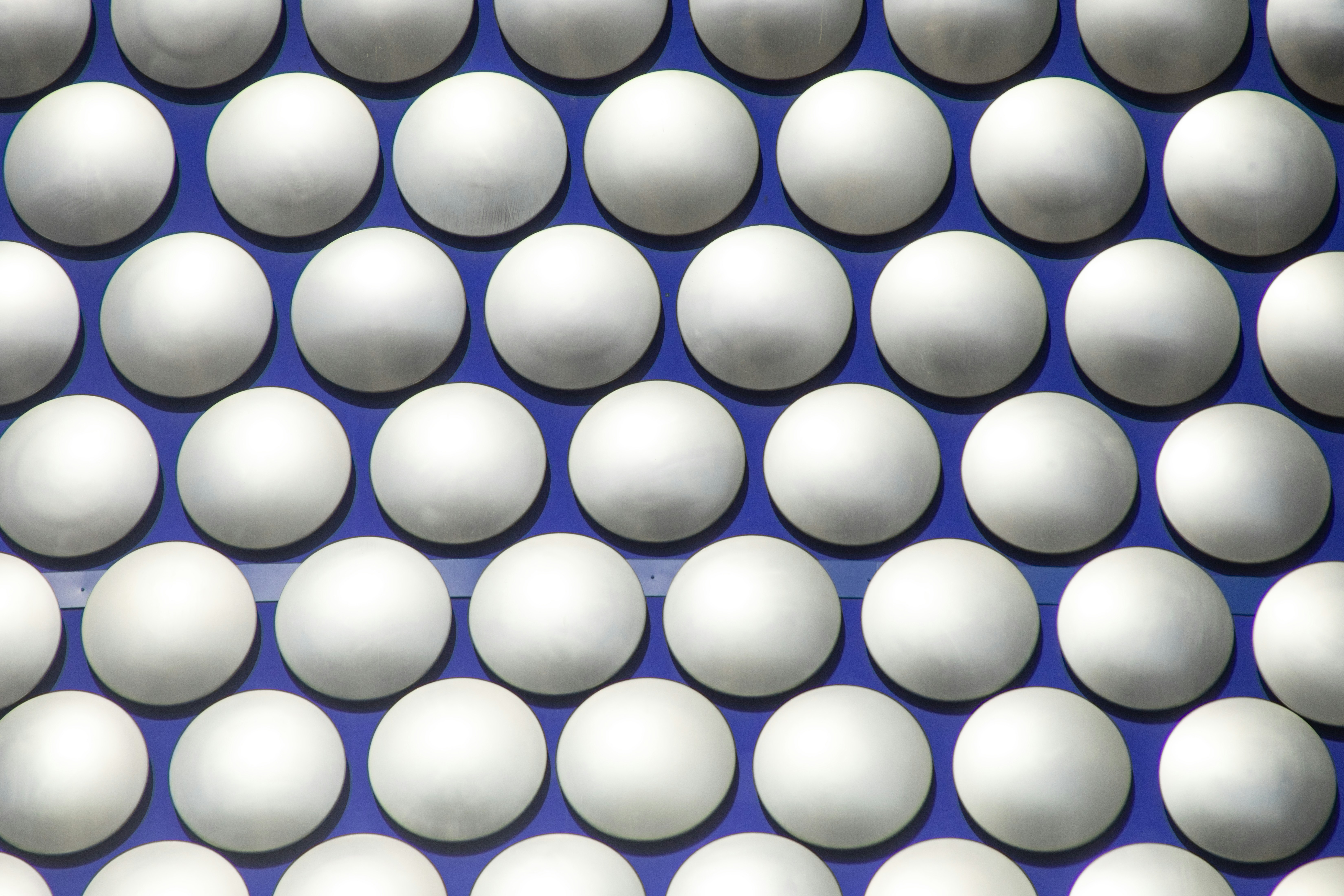 Polished Orbs on a Violet Stage