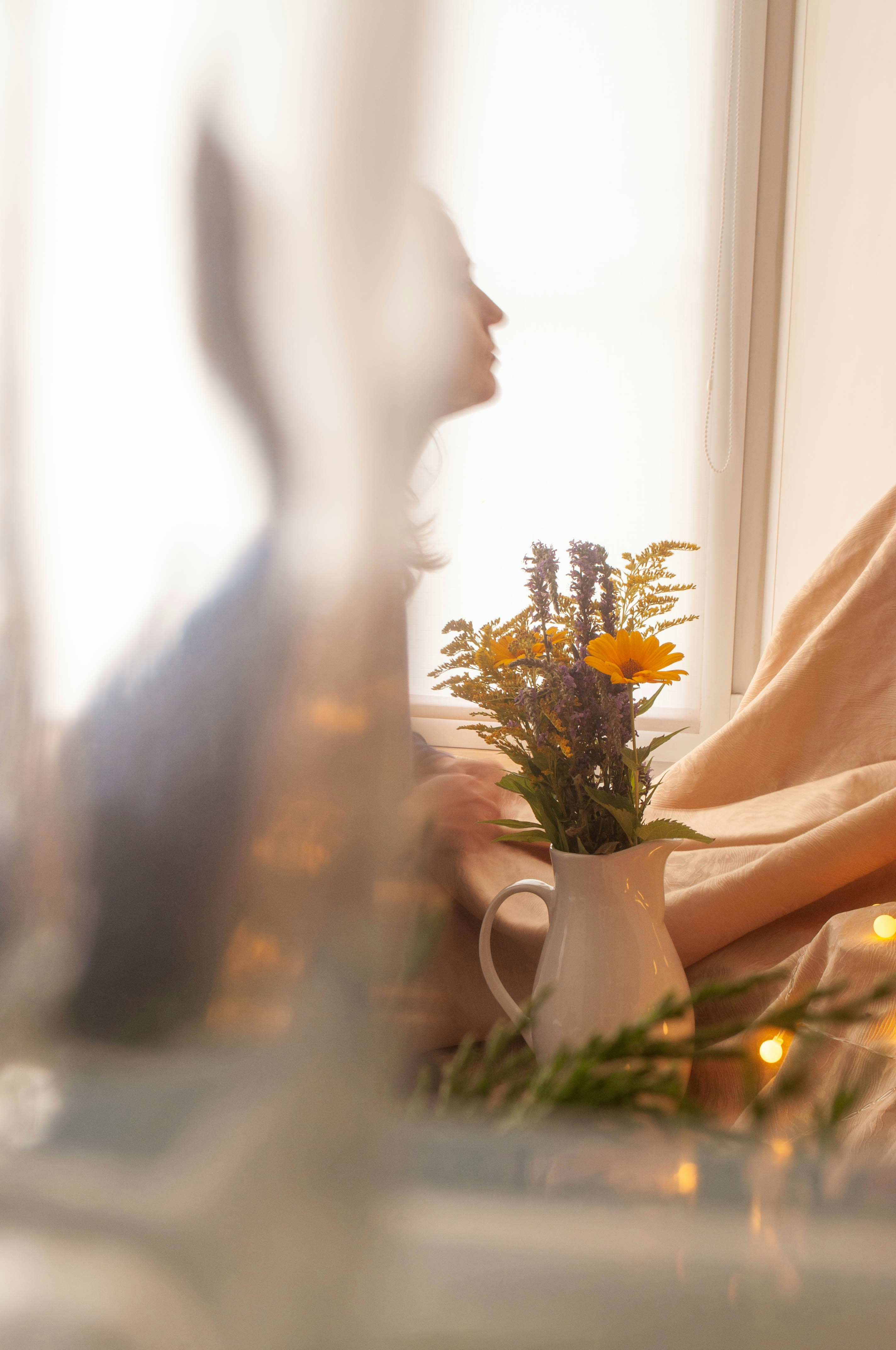 Soft Light, Quiet Moments: A Vase of Wildflowers by the Window