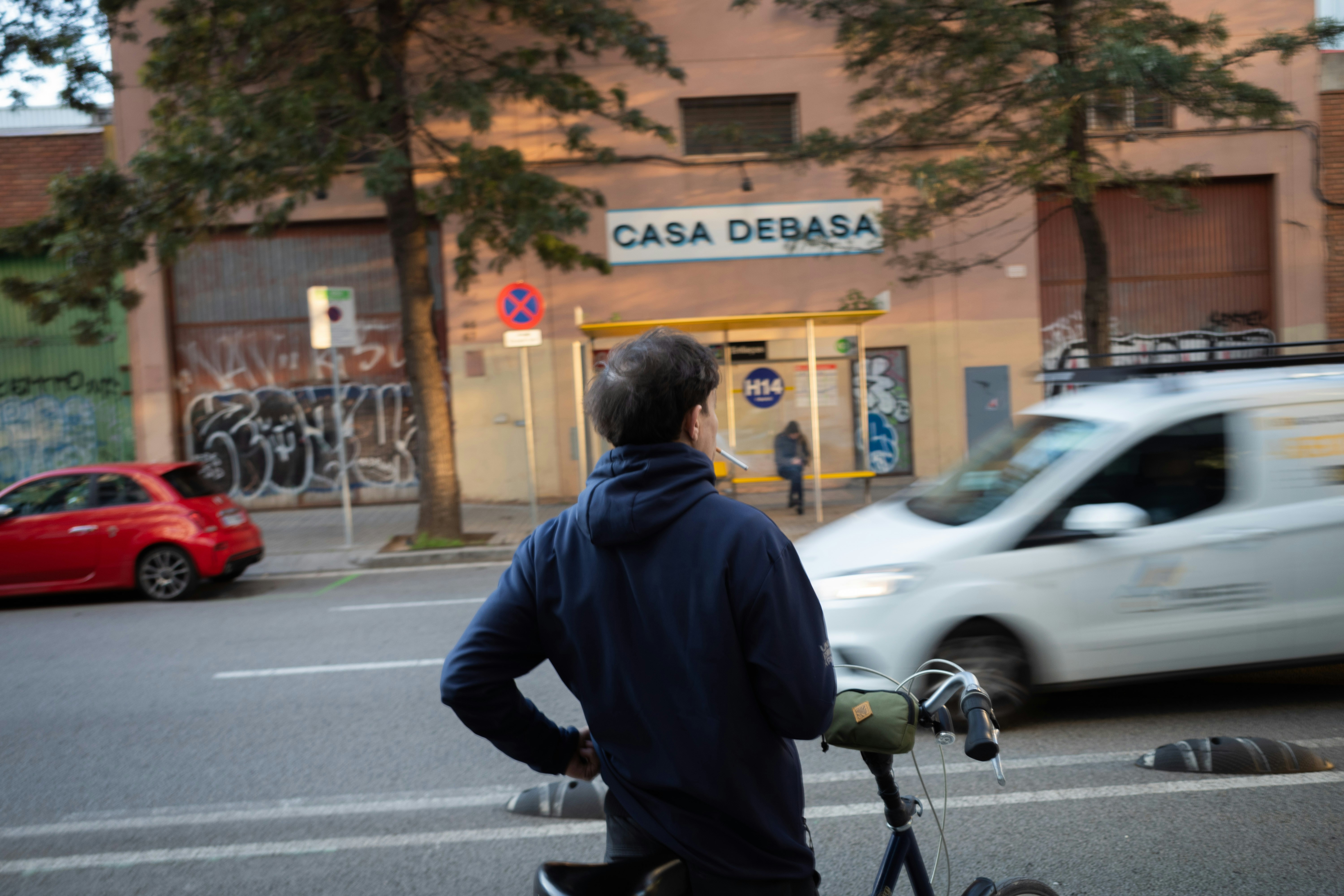 Backpacker in the Street: A Moment of Motion by Casa Debasà