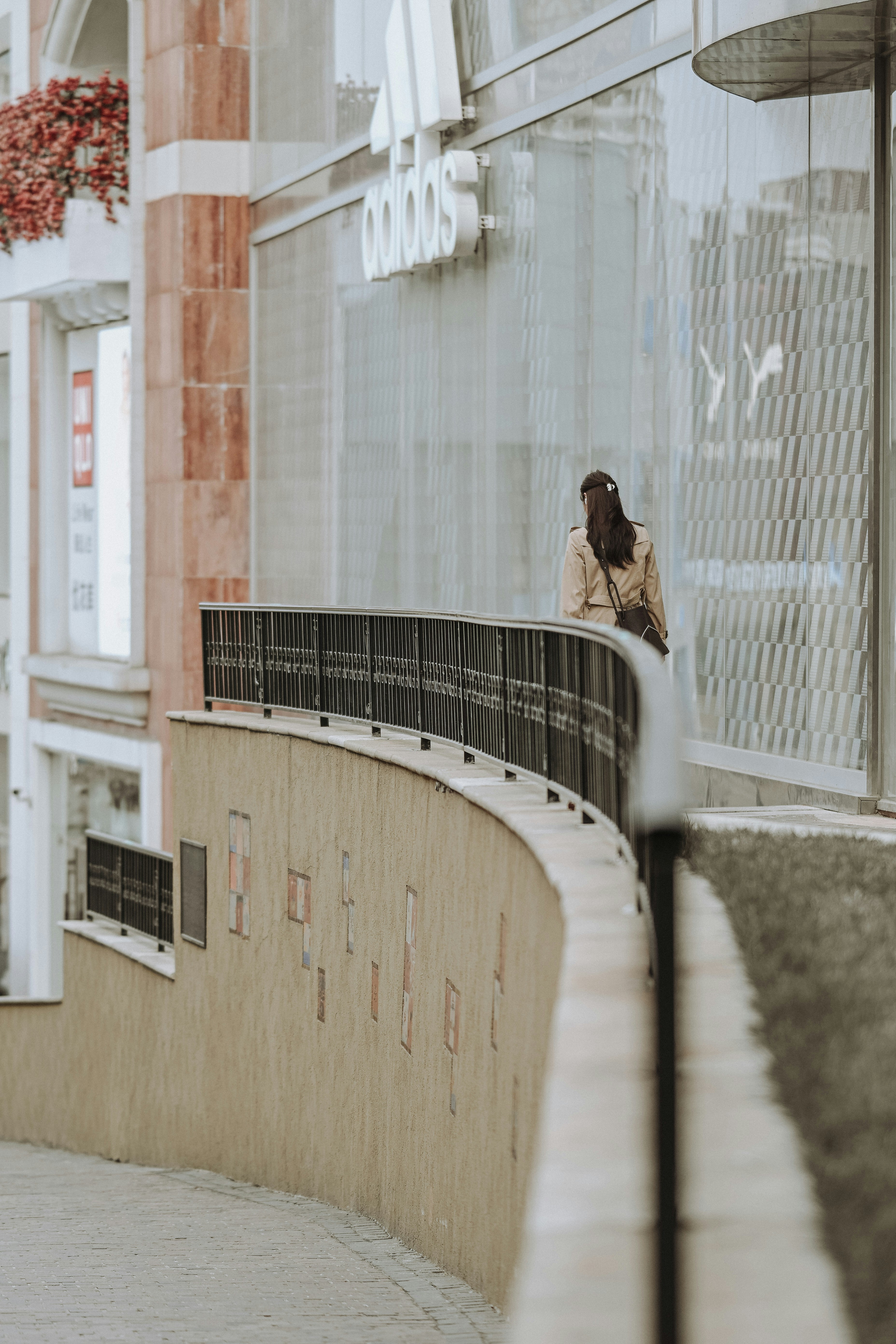 Along the Glass Facade, A Quiet Turn
