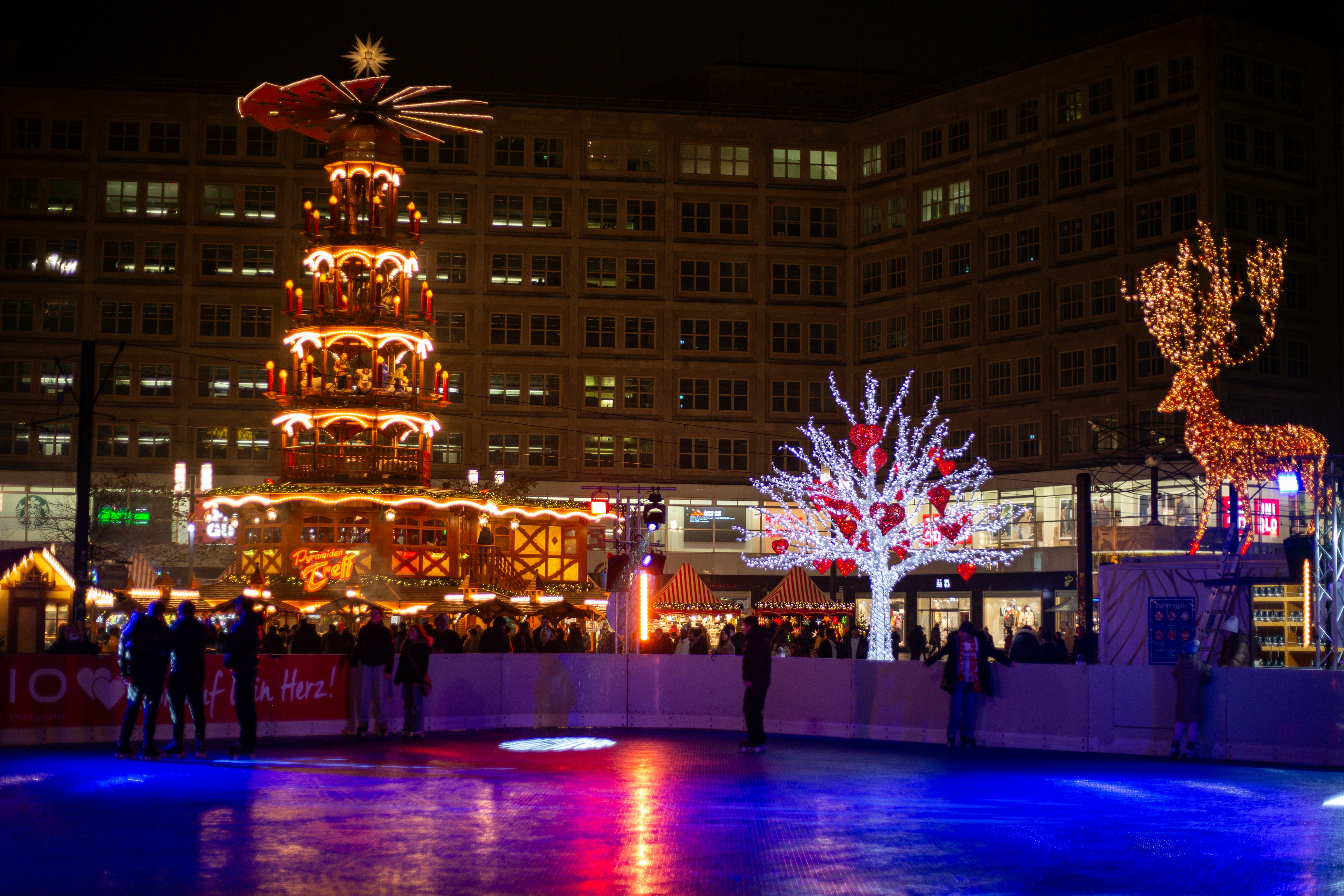 Illuminated Holiday Plaza: A Frosted Night at the Ice Rink