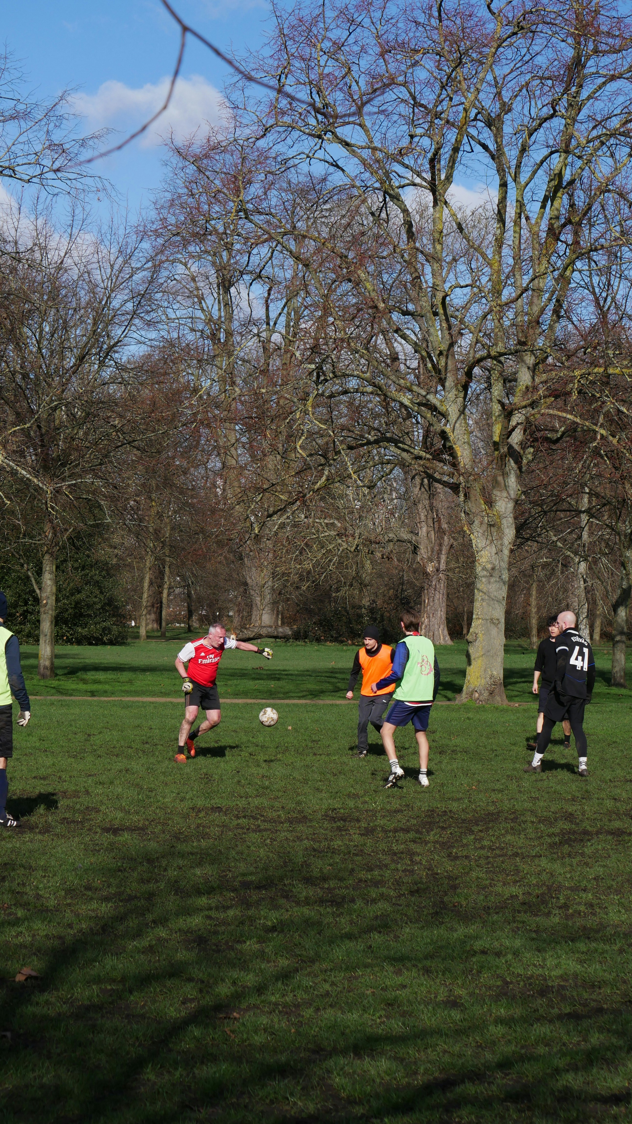 Midfield Match Under Bare Trees