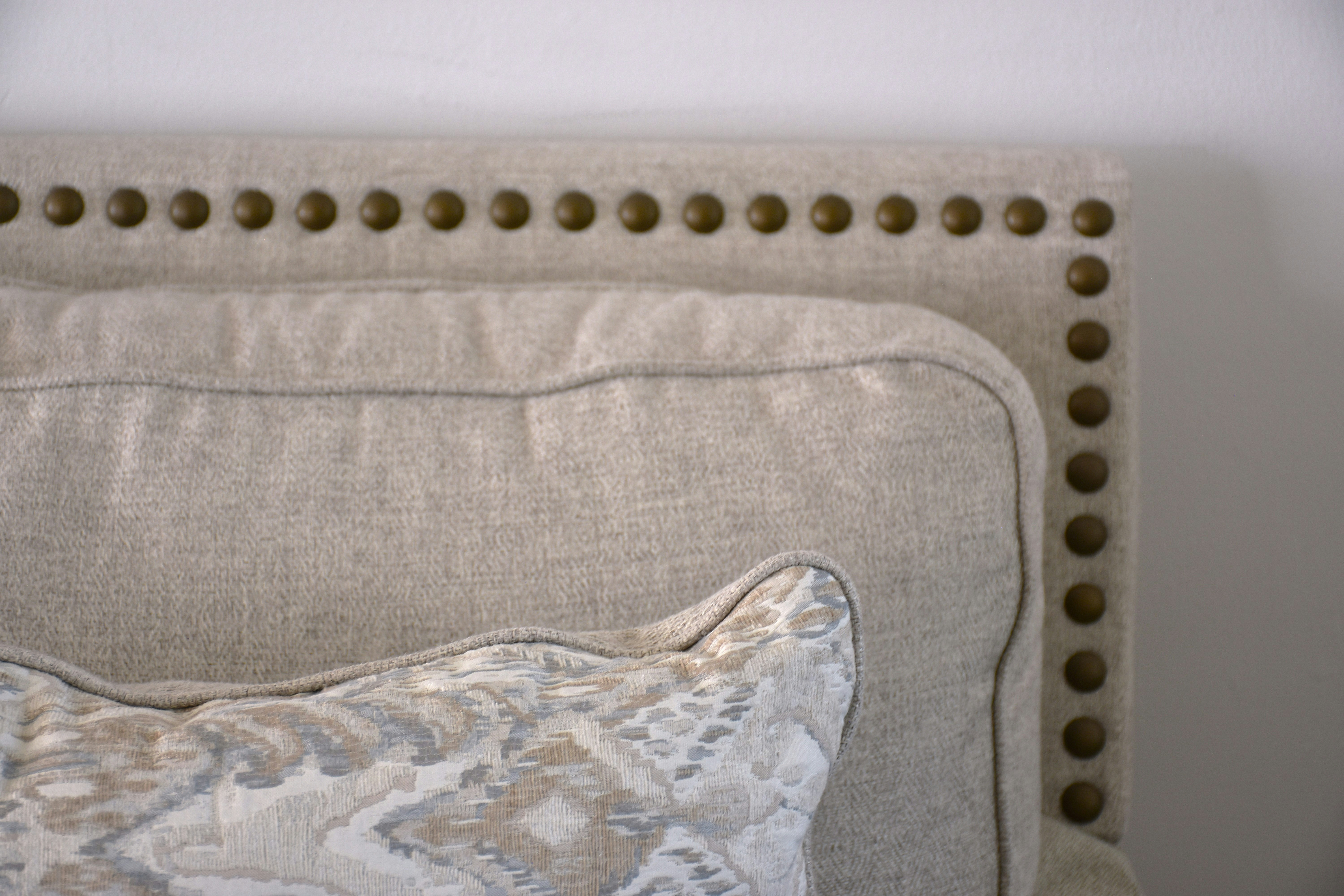 Nook of Quiet Fabric: A Pillow and Studded Headboard