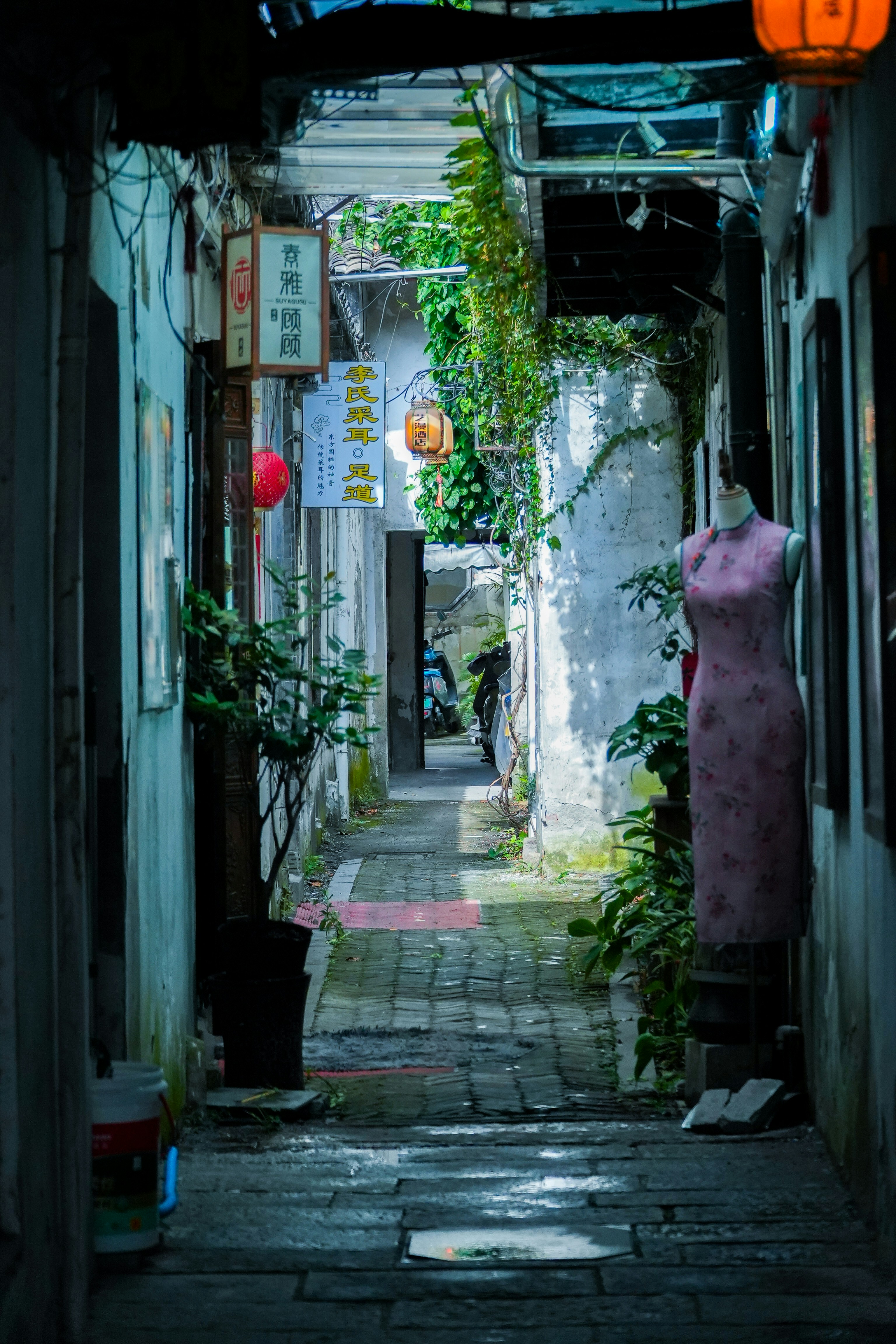 Narrow Alleyway Beneath Hanging Lanterns