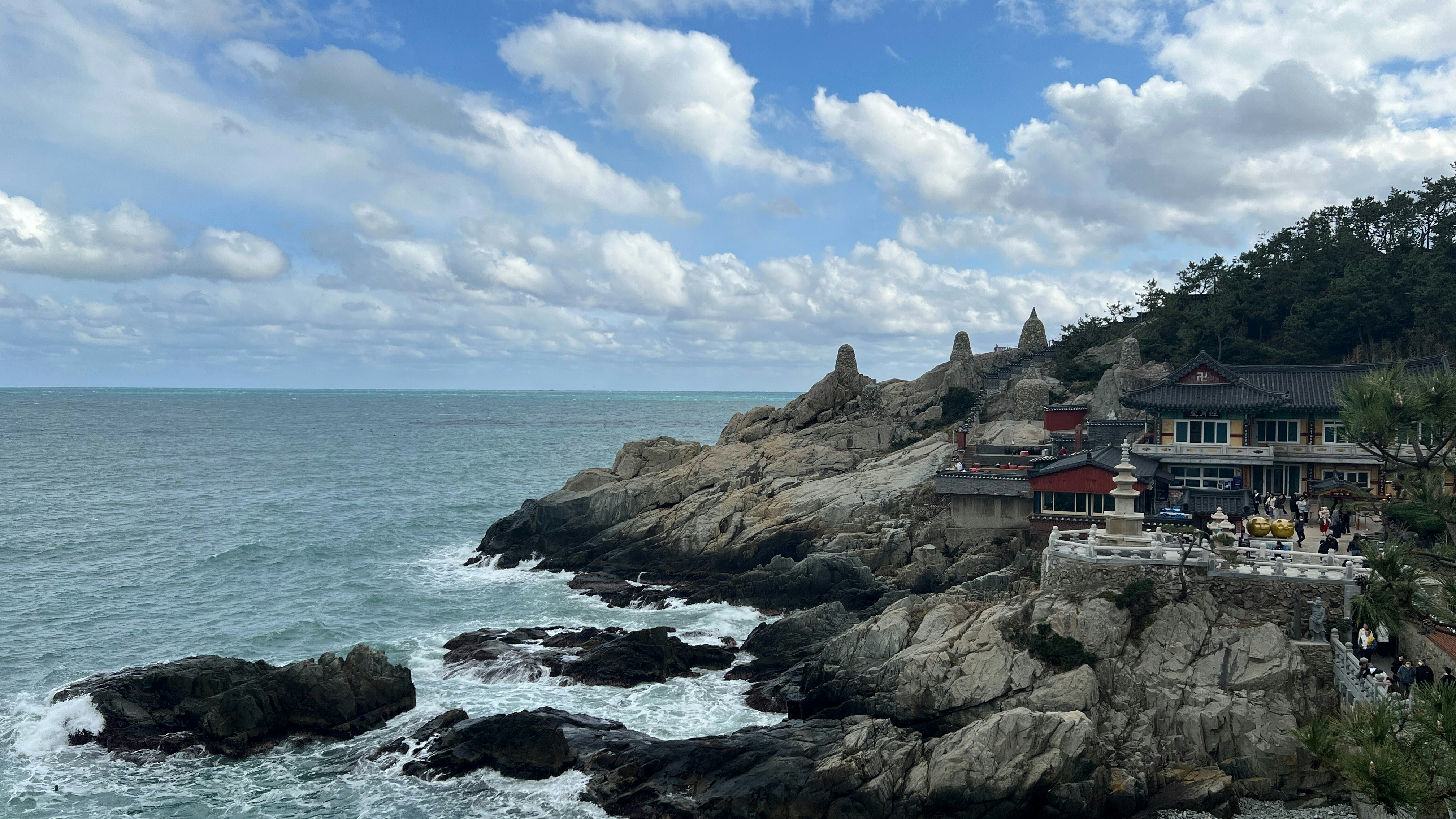 Cliffside Temples Overlooking a Turquoise Horizon
