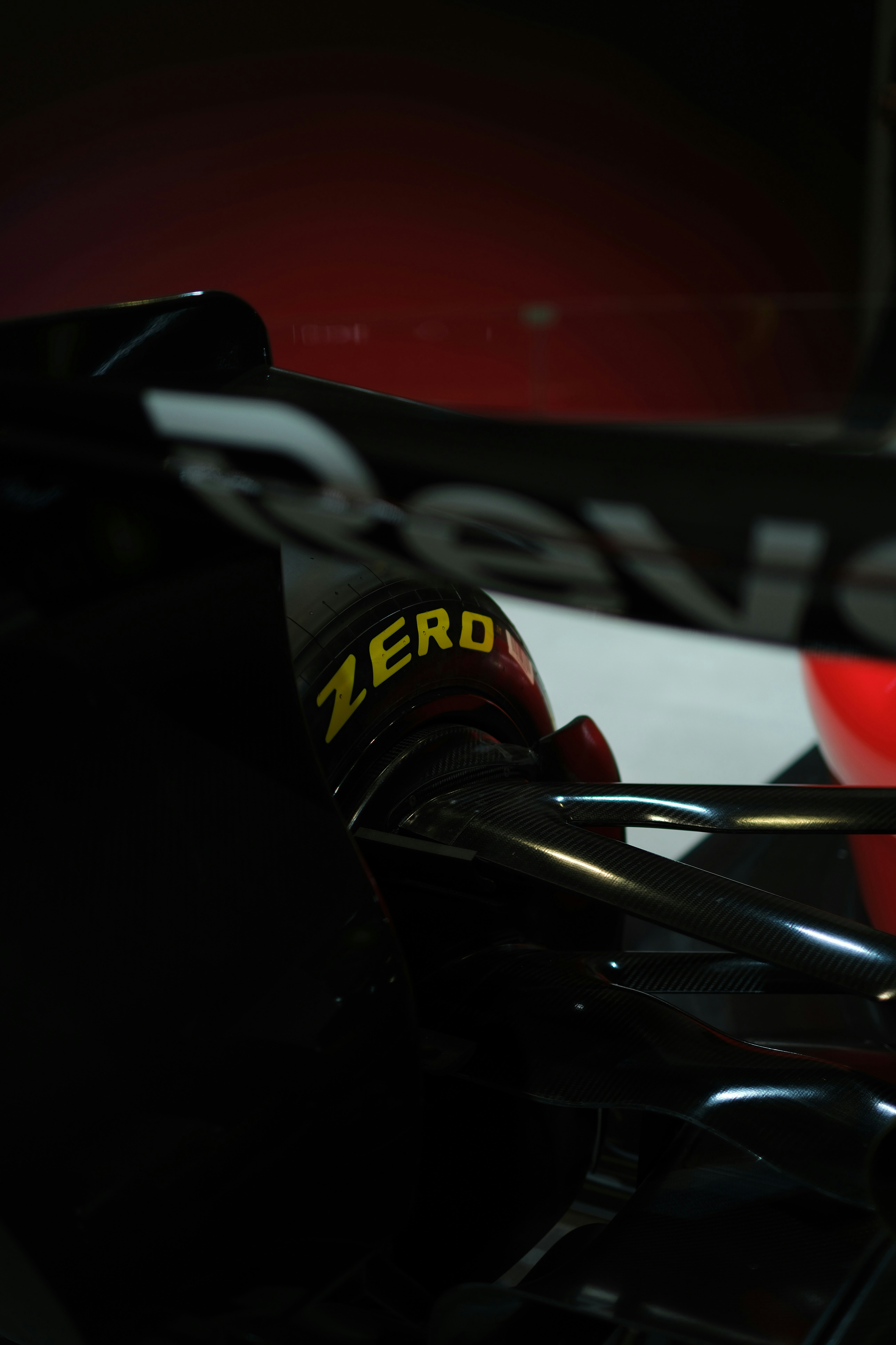 Zeroing In: A Red Cassette of Power on the F1 Car's Side