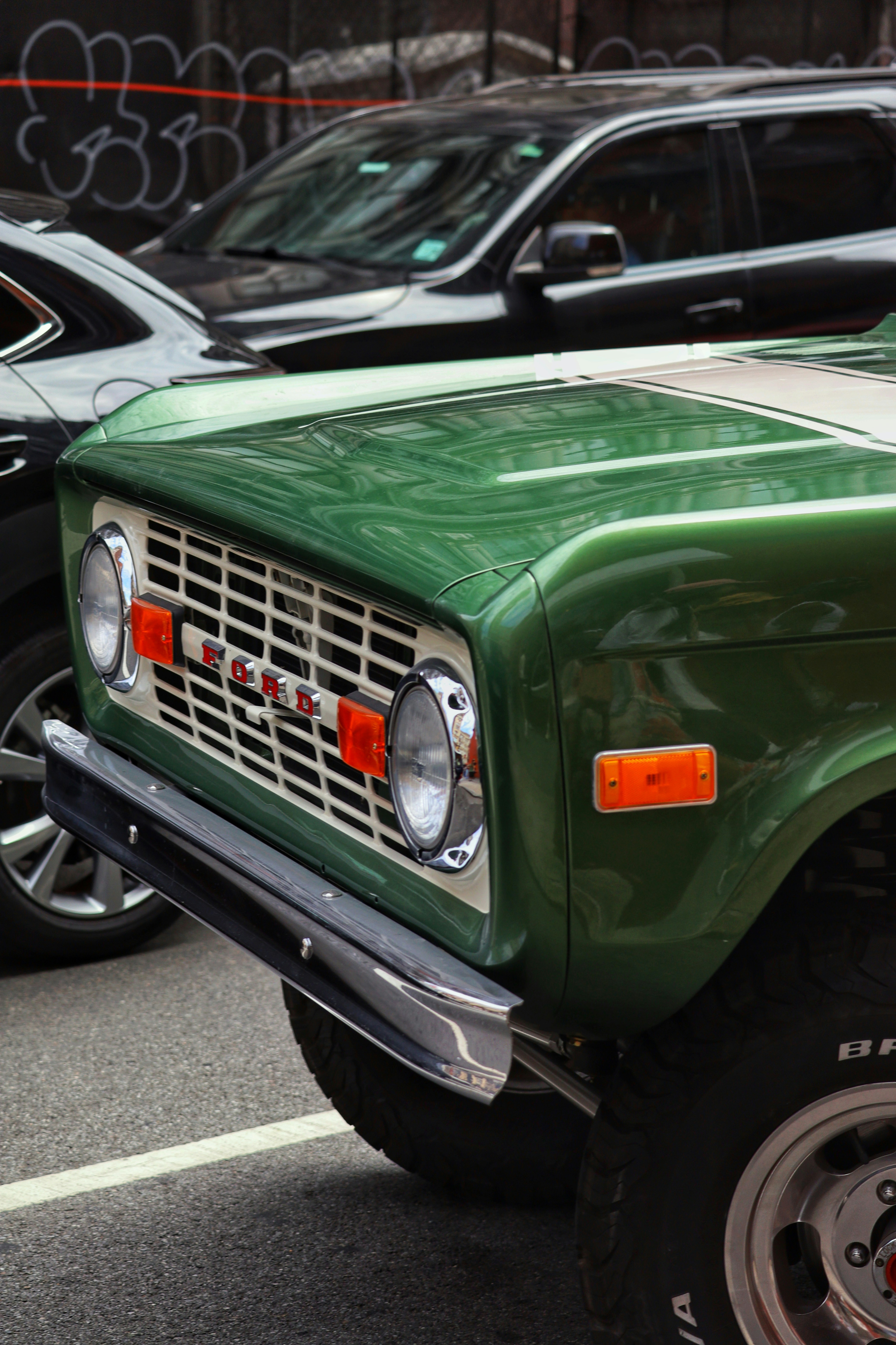 Green Ford Vintage Grille: Bold Chrome and Headlight Contrast