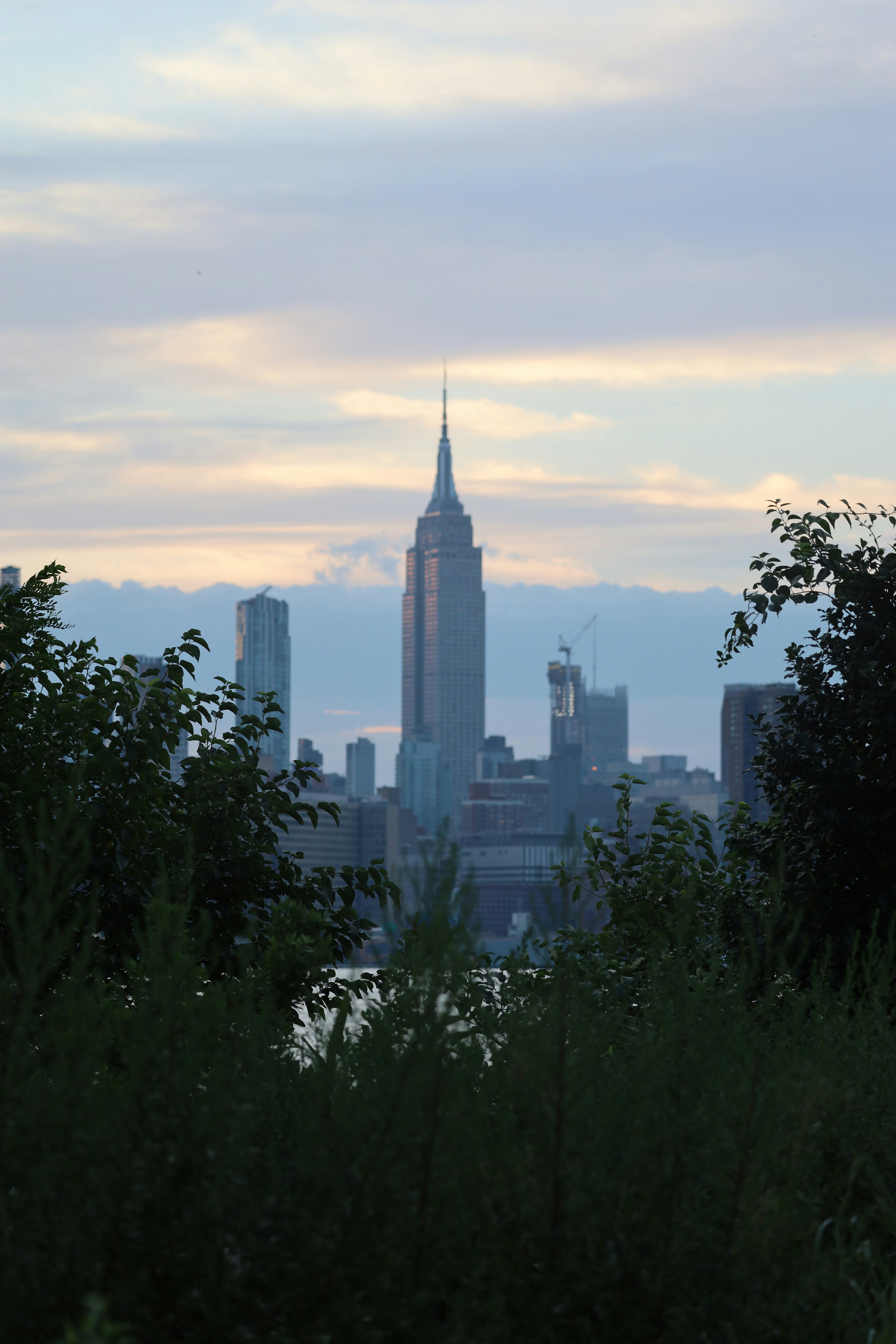 Empire state building among new york city skyline photo – Free ...