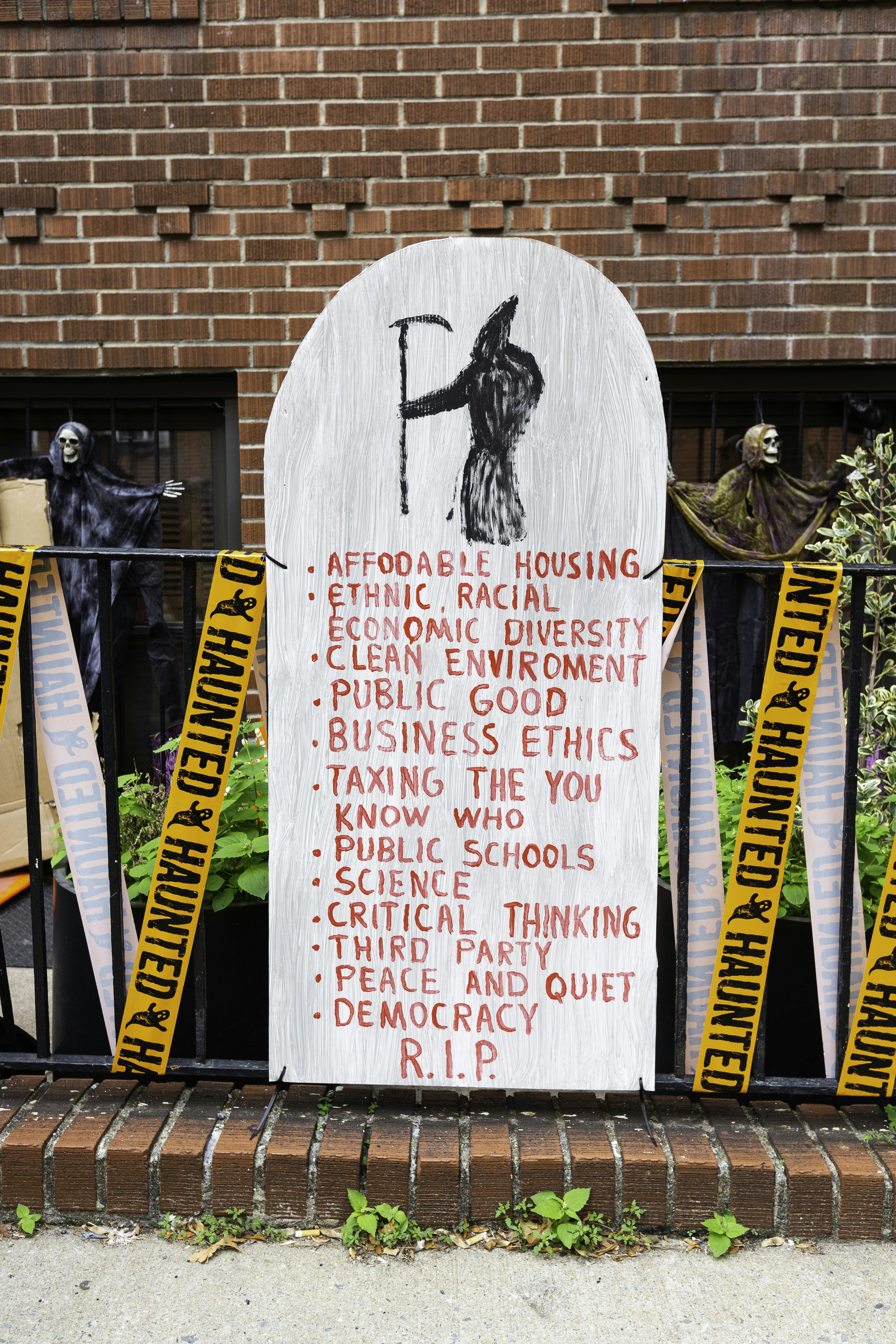 Message of Hope on a White Tombstone: A Civilized Protest at a Brick Stairway