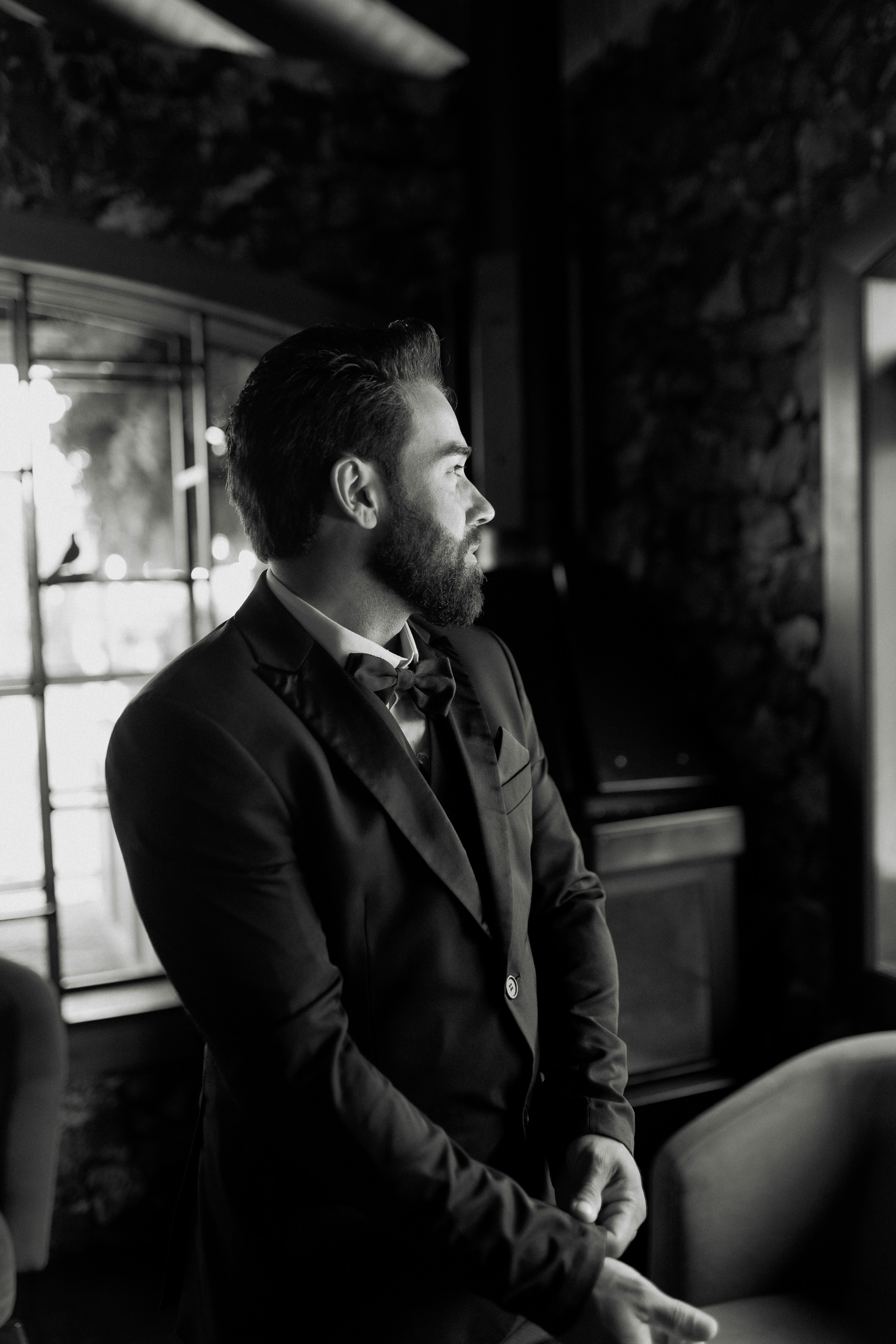 Portrait of Quiet Dignity: A Groom in Midnight Velvet