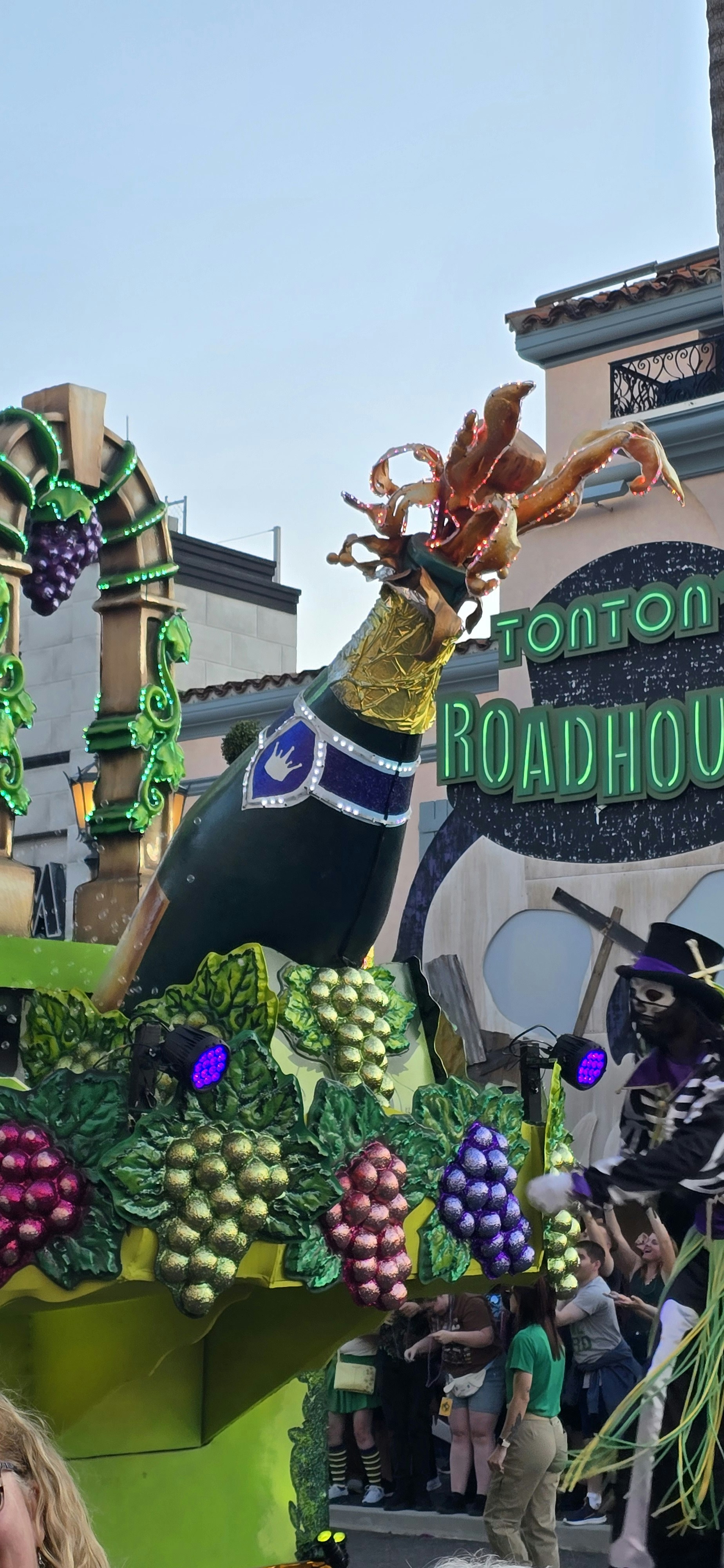 Grapes and Goblets: A Festive Parade Float in Motion