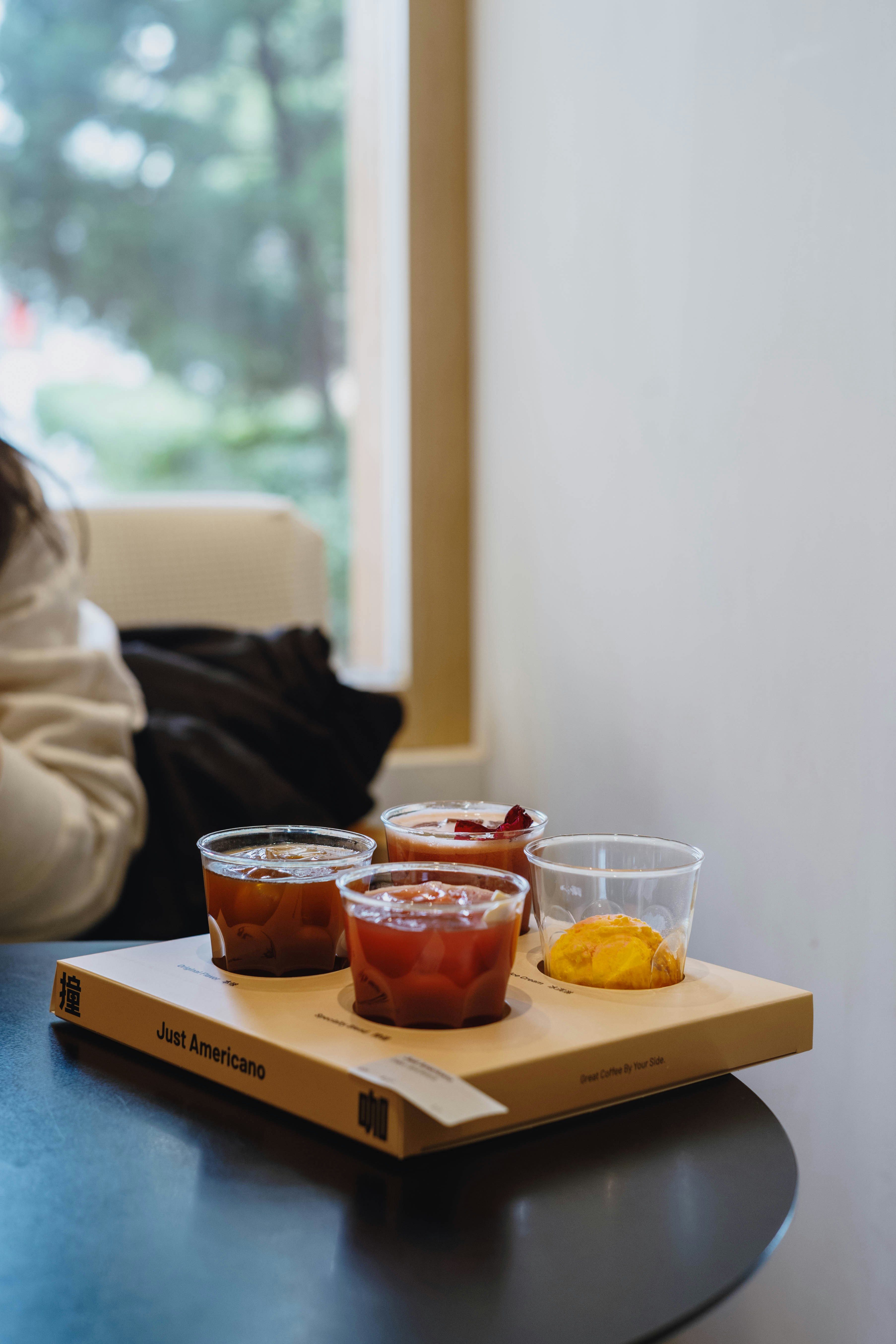 Cafe Table Symposium: Iced Coffee Trio on a Minimalist Desk