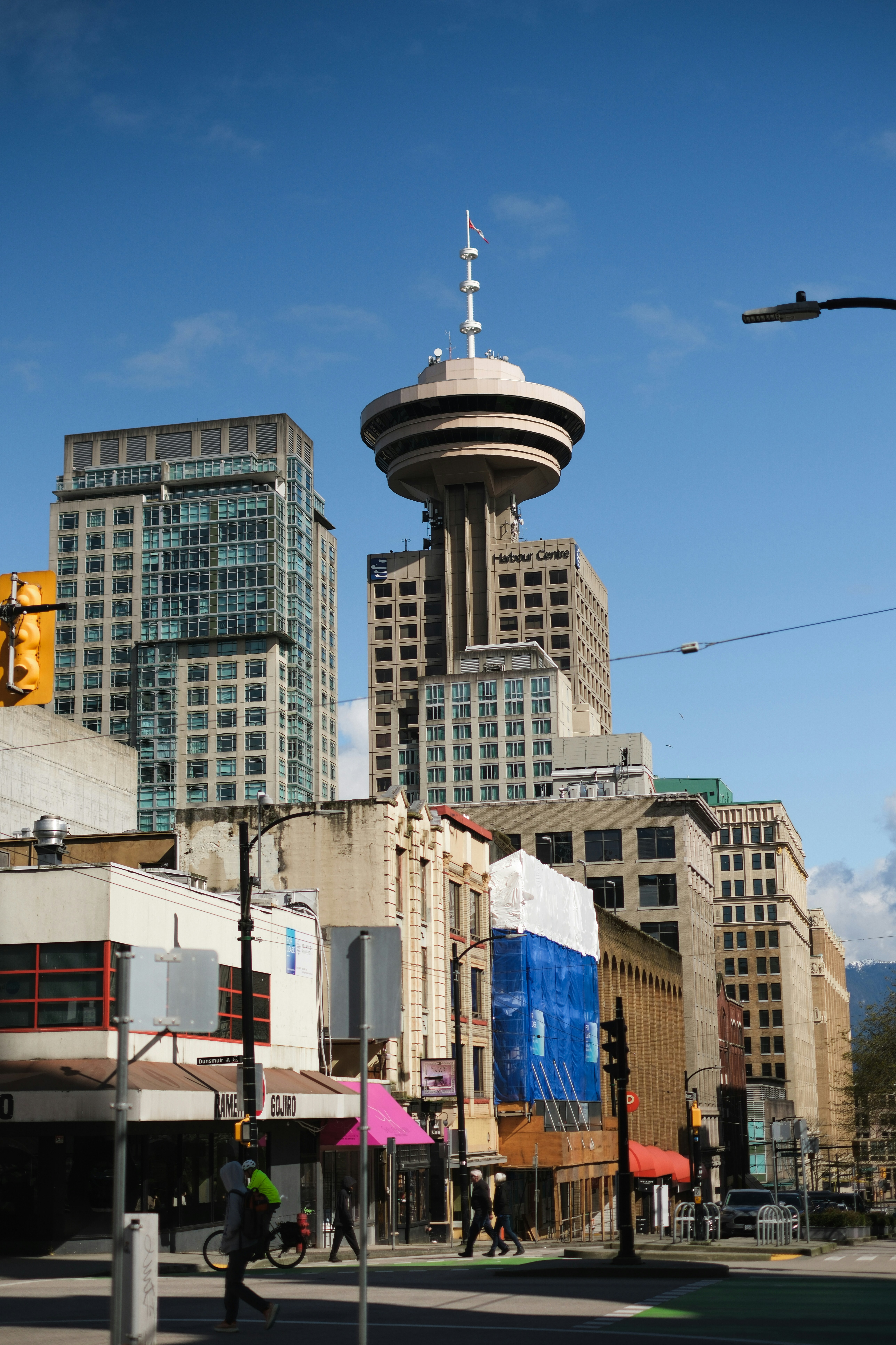 City Top: The Needle and the Towers Rising Above a Busy Block