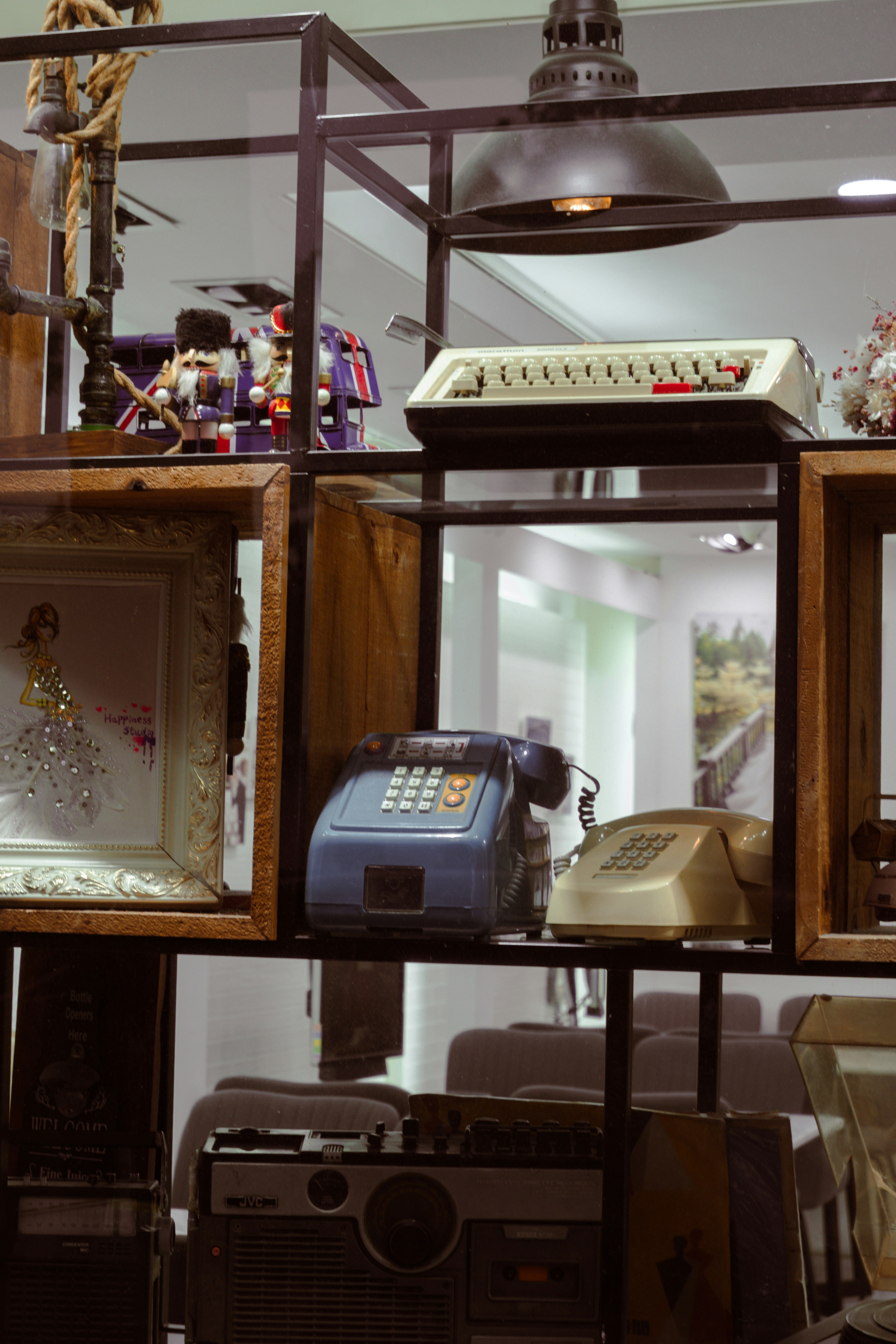 Vintage Shelf Portrait: Echoes of Retro Telephones and Toy Figures