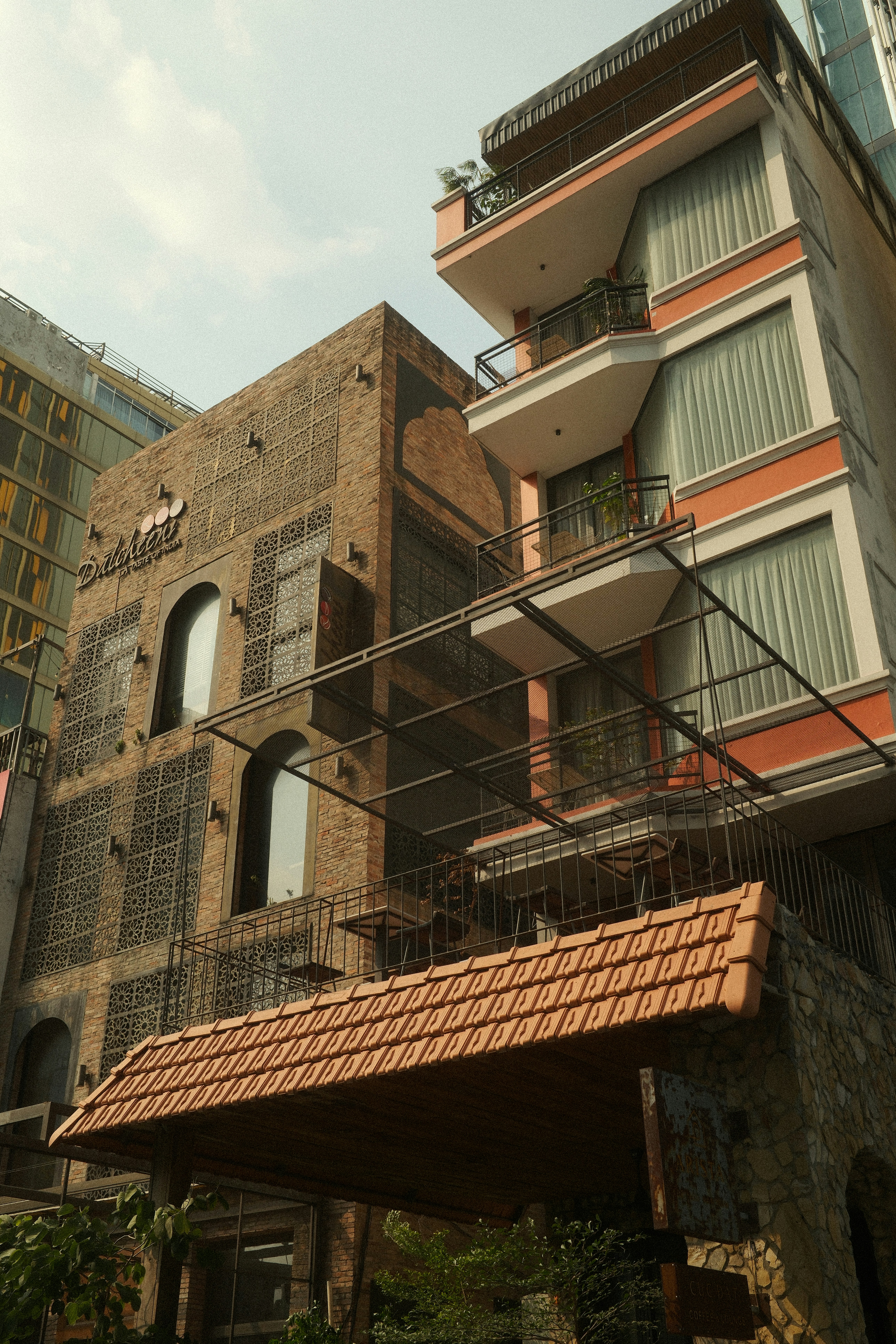 Brick Facades and Balconies Reach for the Sky
