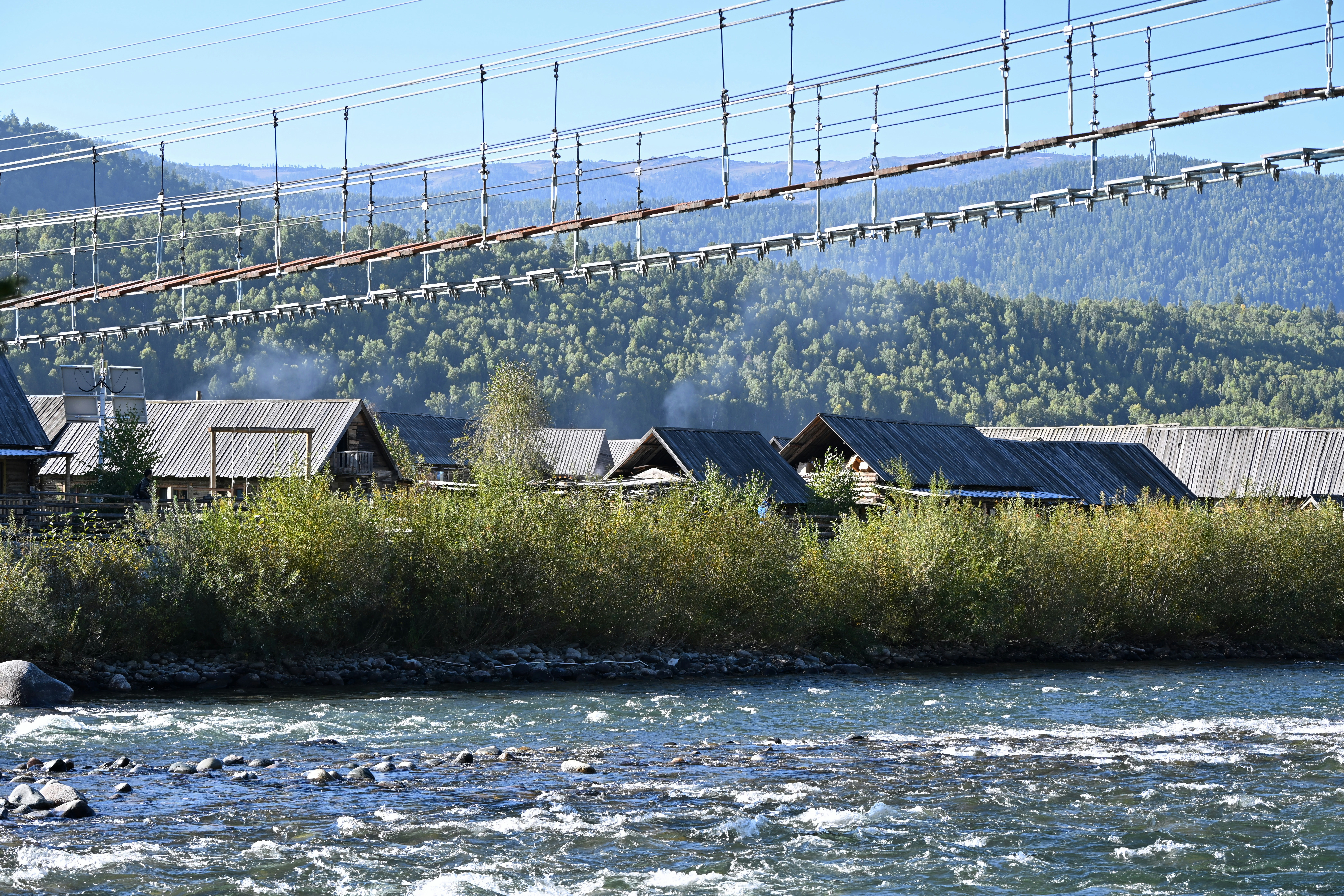 Riverside Village Under a Cable Bridge