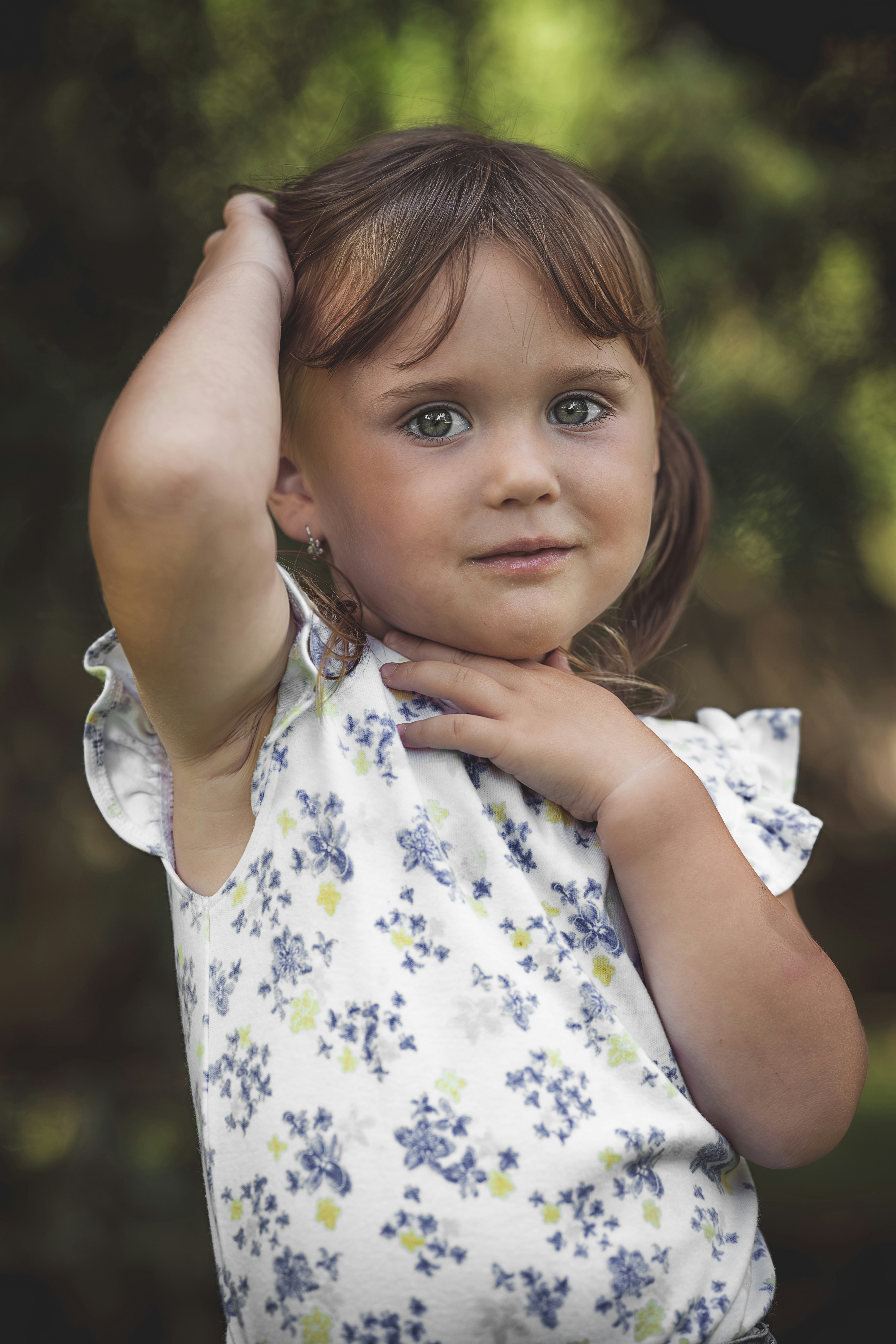 Soft Portrait of a Little Girl in Sunlit Garden