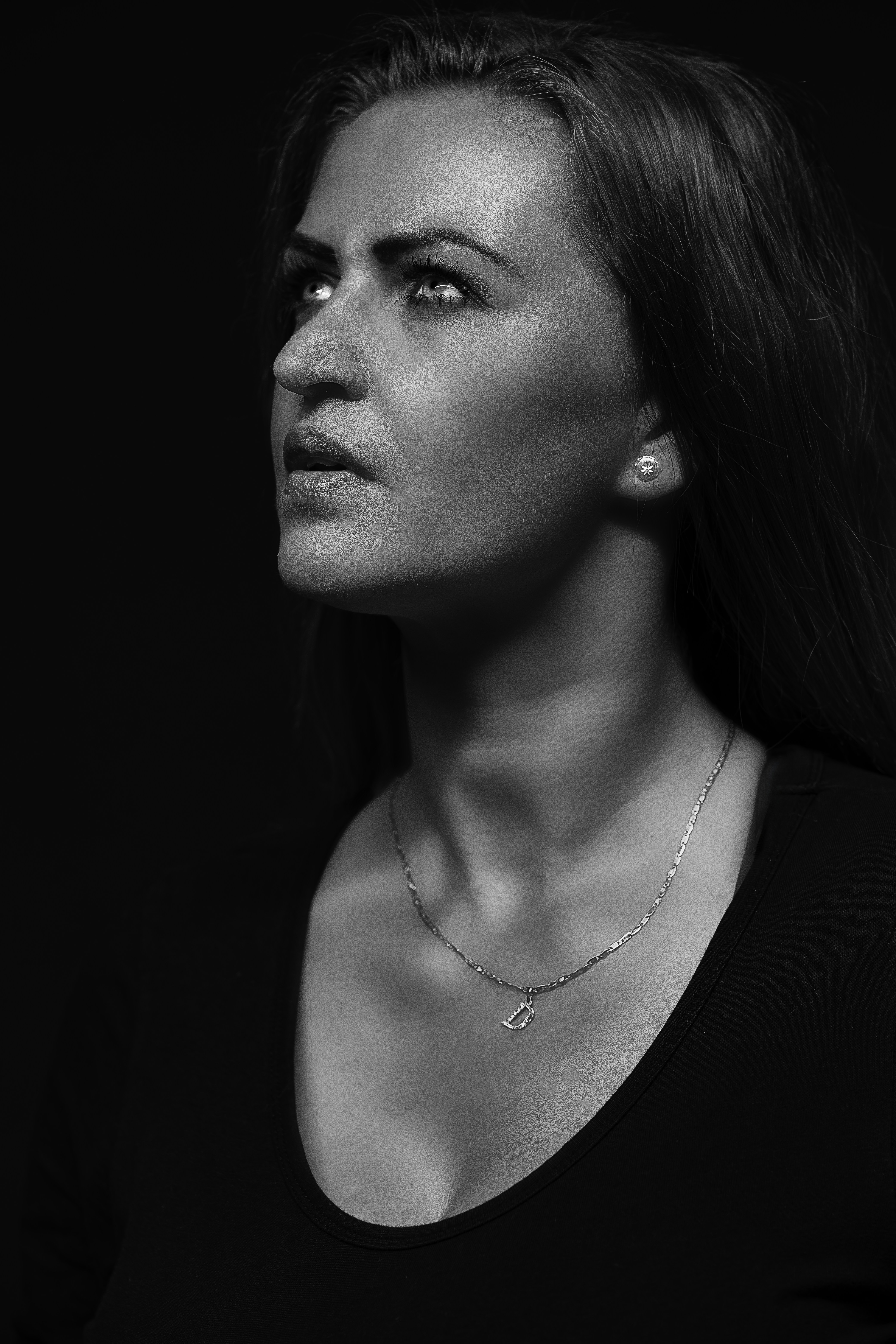 Portrait in Shadow: The Gaze of Quiet Demeanor