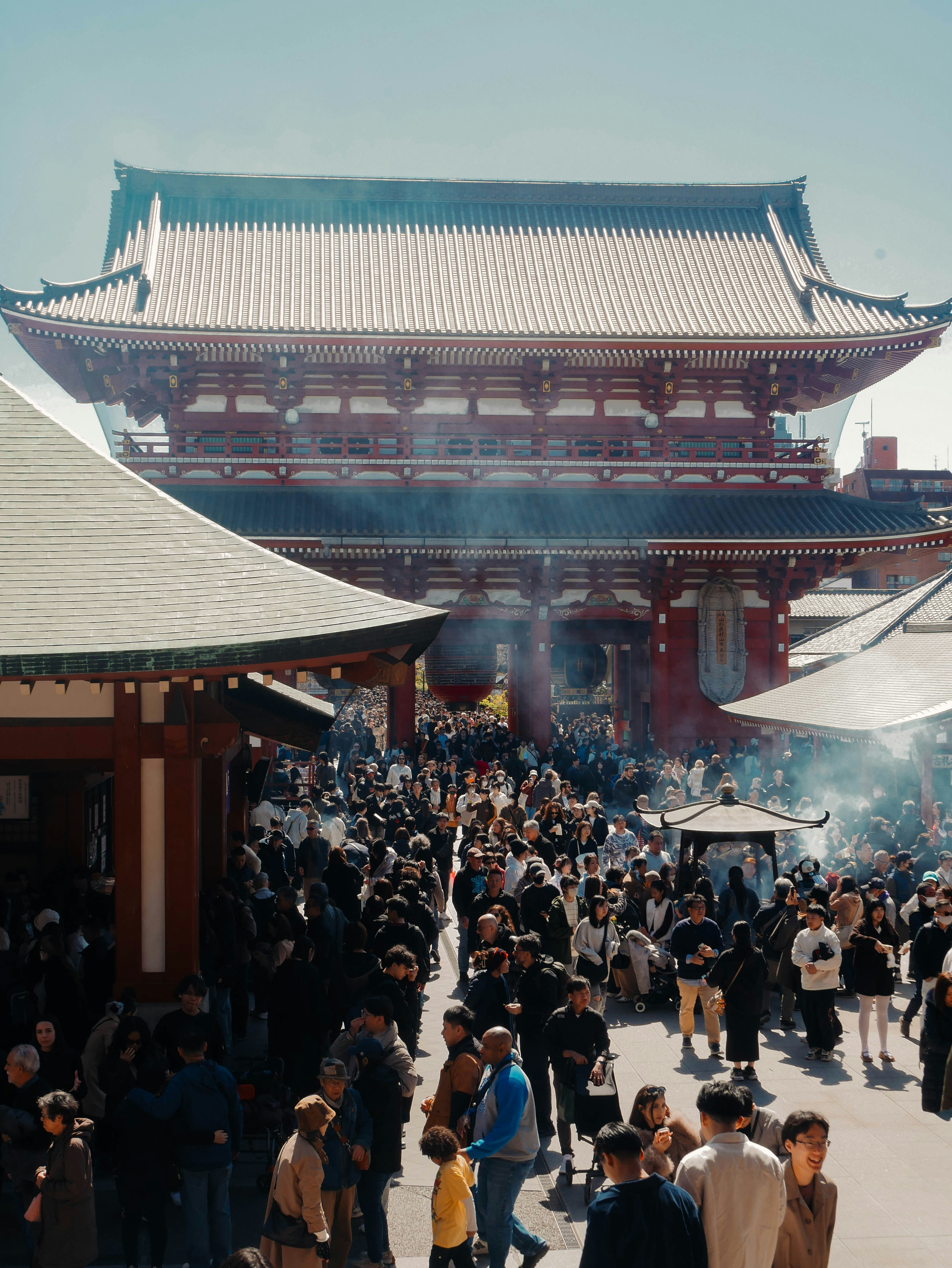 Crowd at the Gate: Quiet Momentum Beneath Temple Eaves