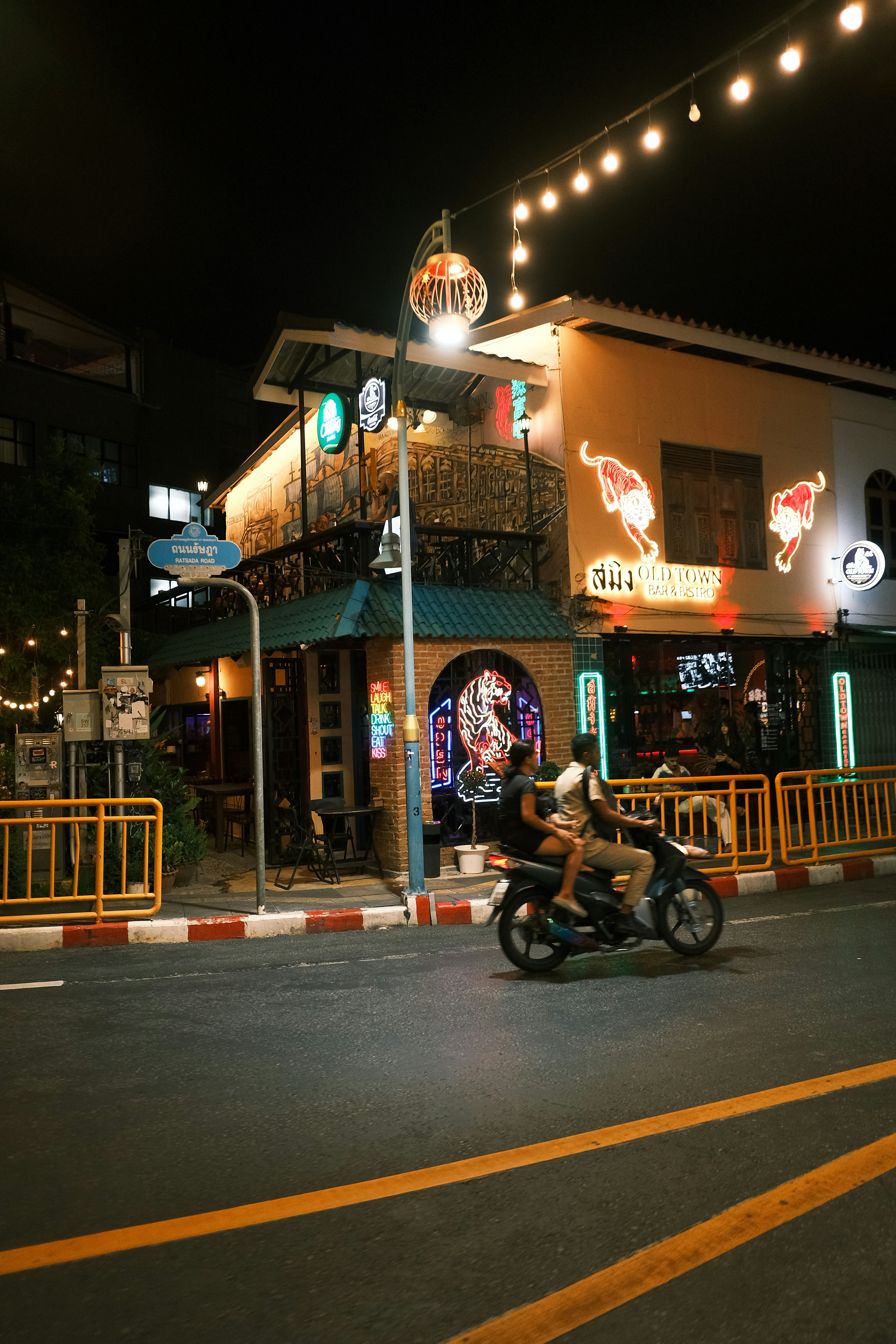 Nightlife on the Corner: Neon Dragon and City Riders