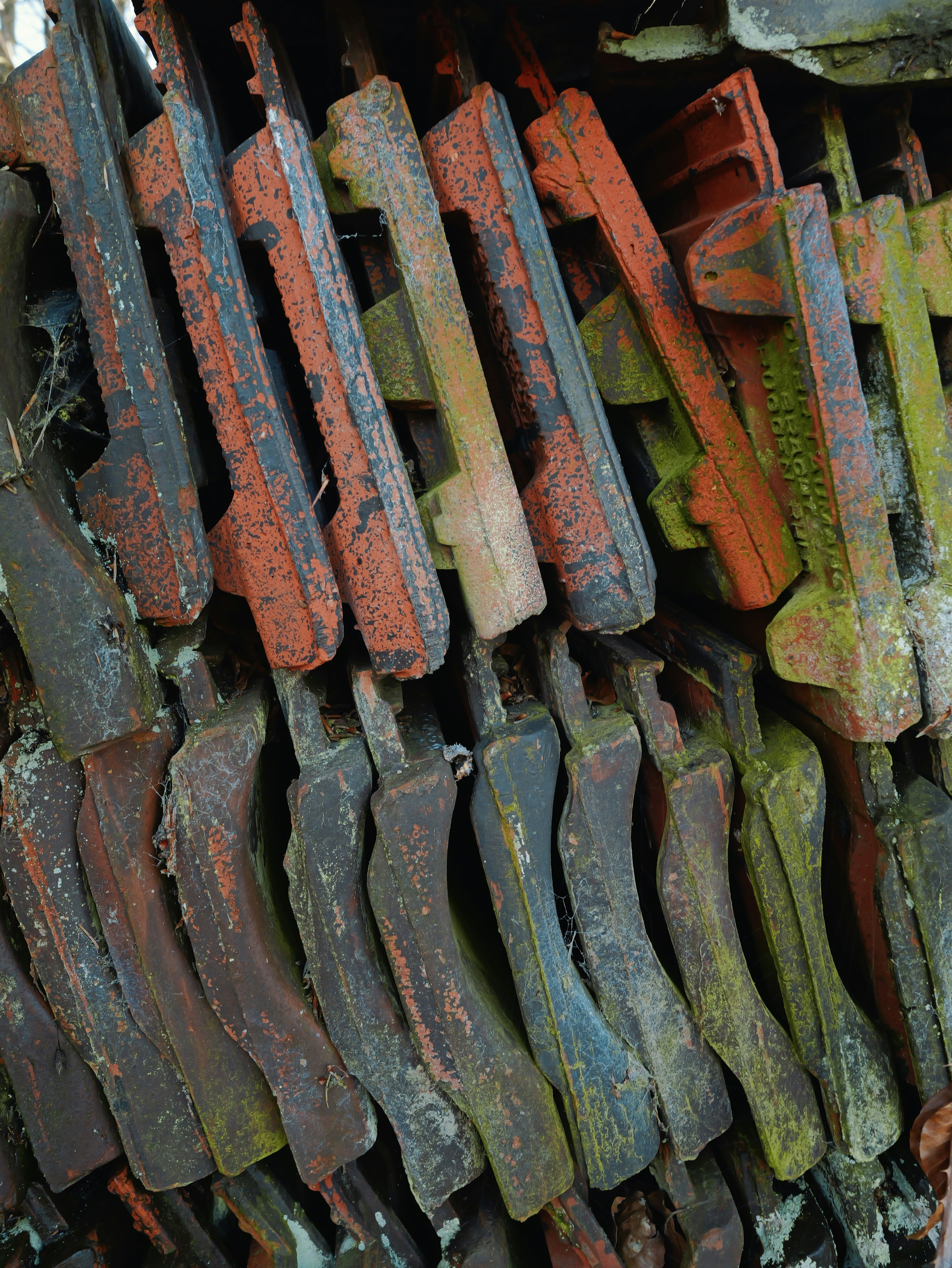 Rust and Moss: A Tangle of Weathered Metal Slats