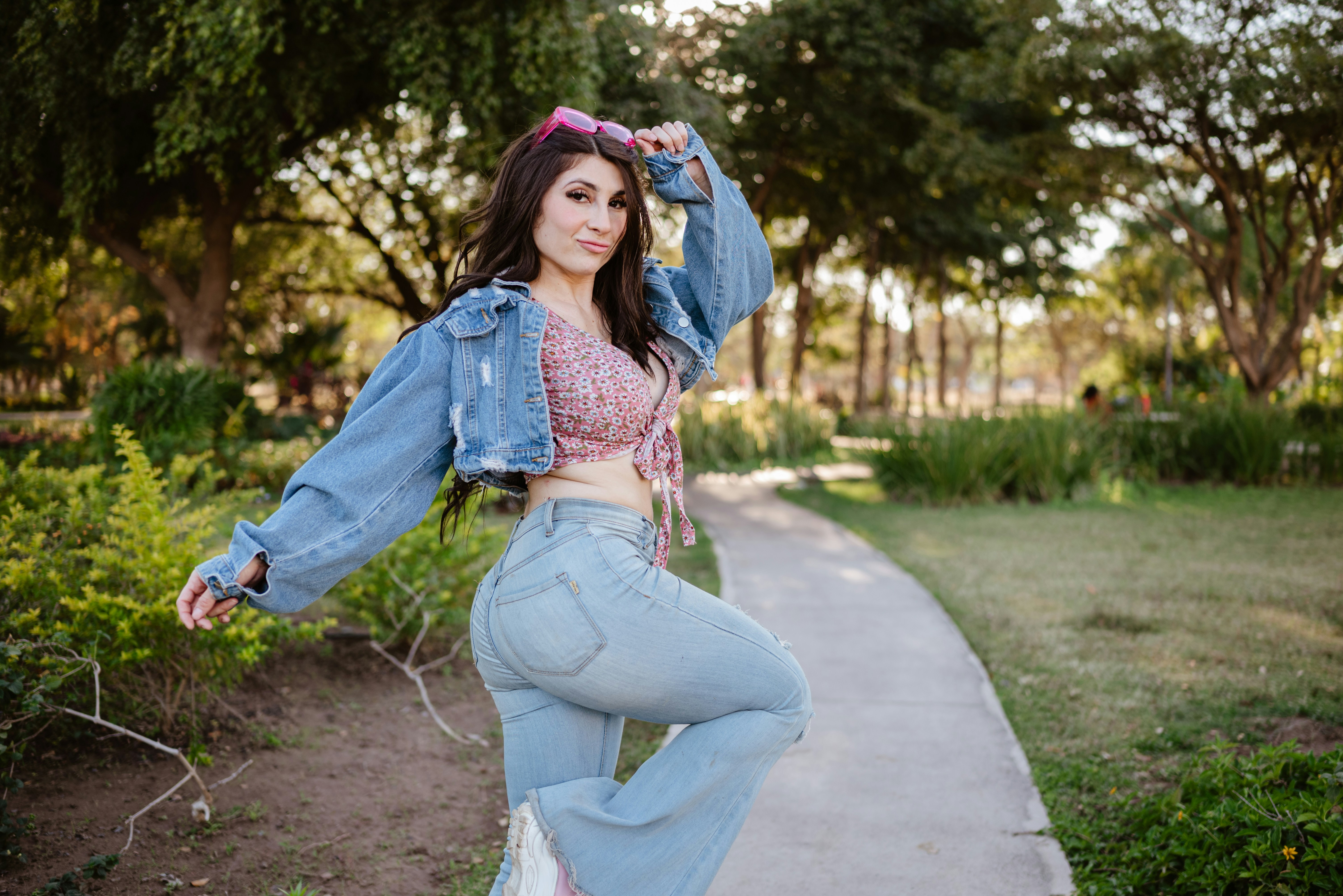 Denim-Dawn Pose: A Fashioned Stride through the Park