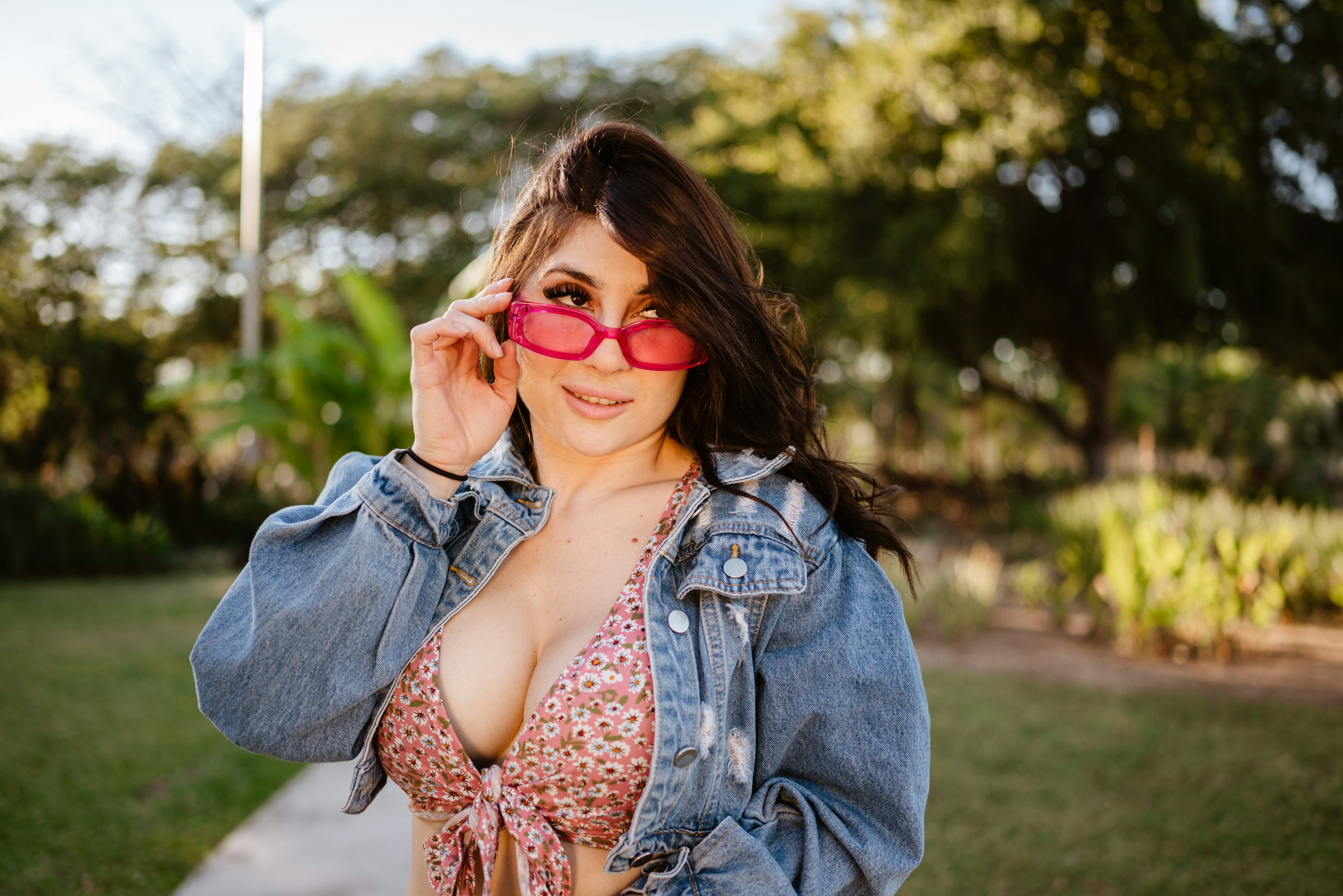 Sunlit Confidence: A denim-clad Portrait in Soft Focus