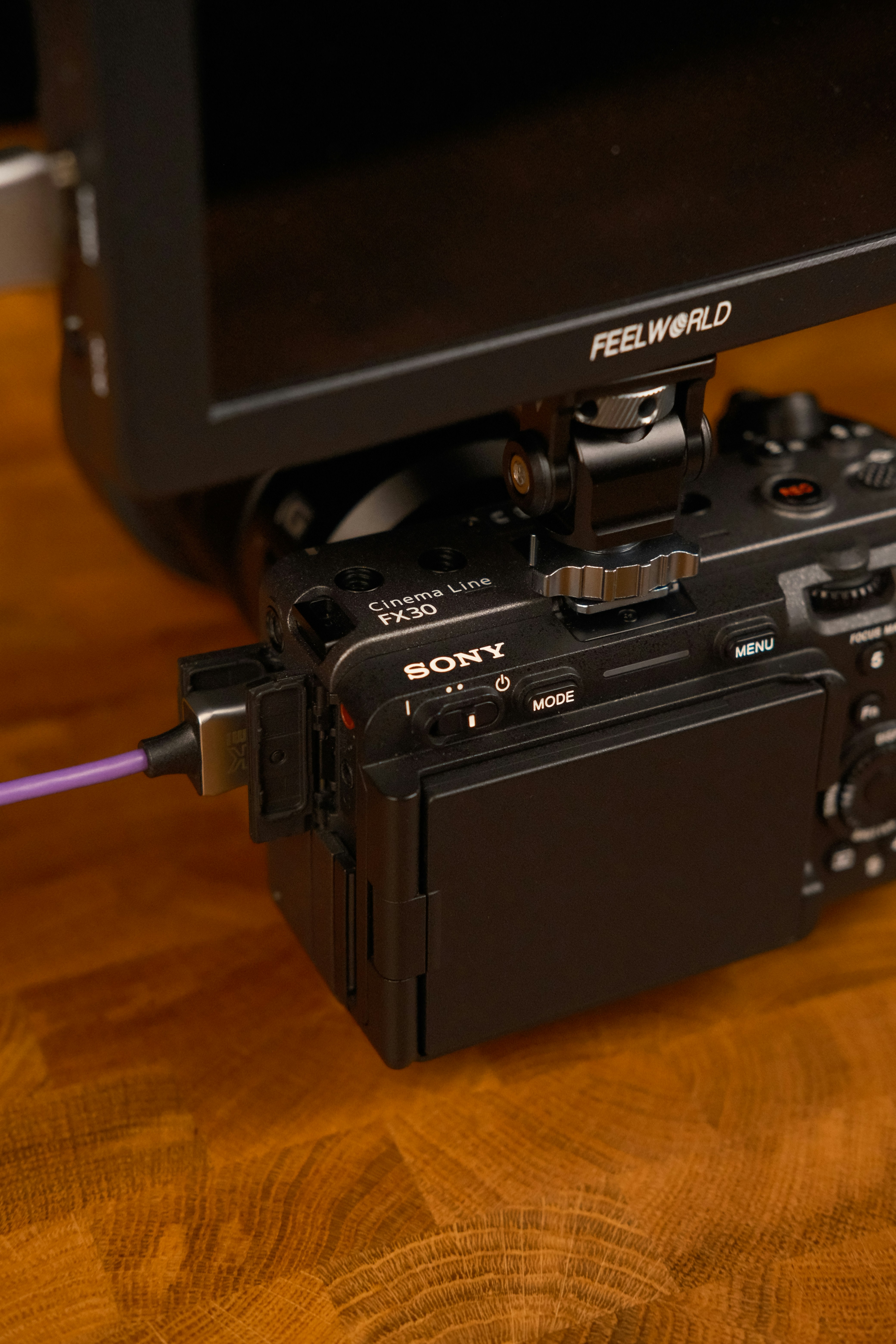Cinematic Compact: A Sony Camera Mounted Under a Monitor