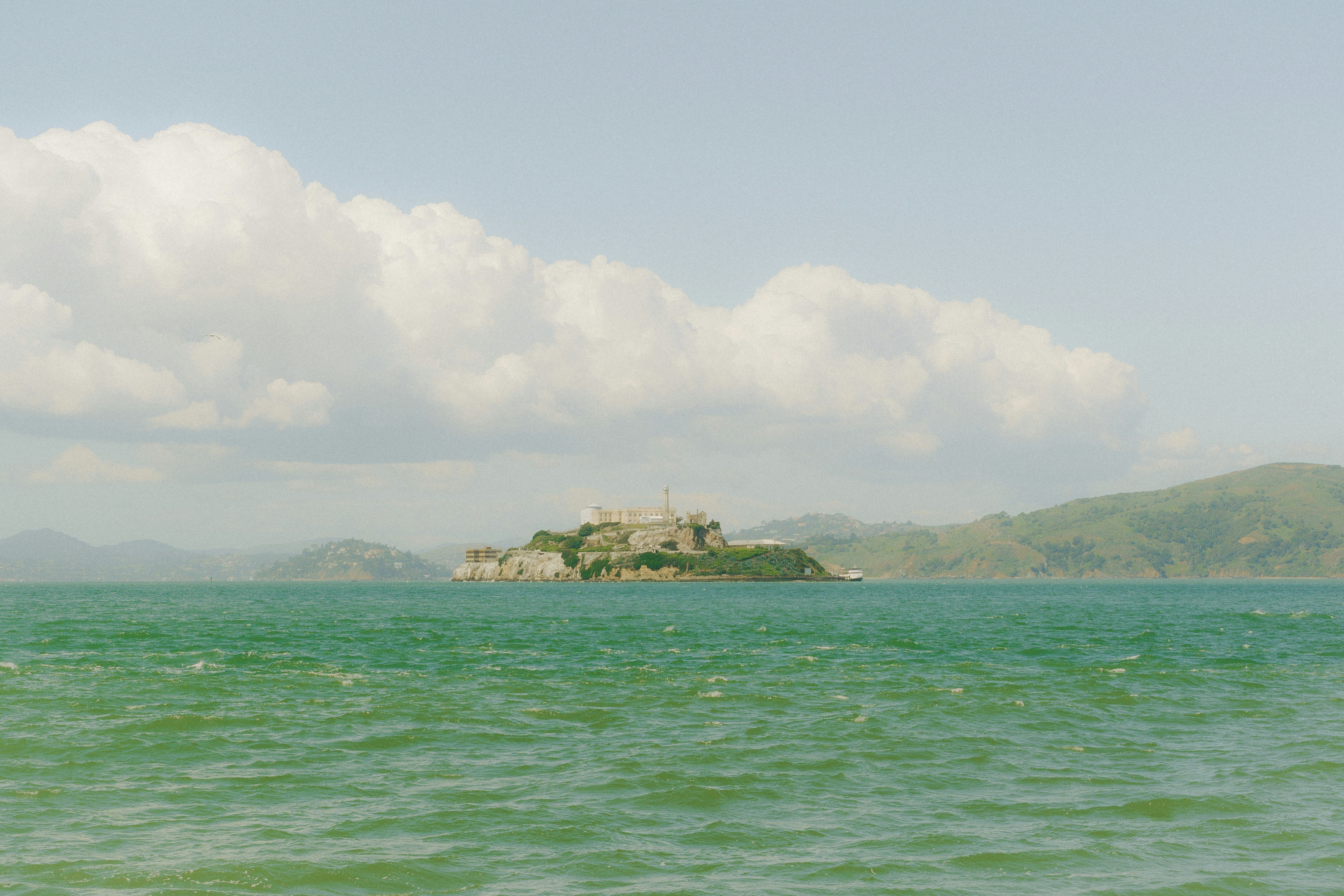 Isolated Fortress: A distant island citadel Rising from Emerald Waters