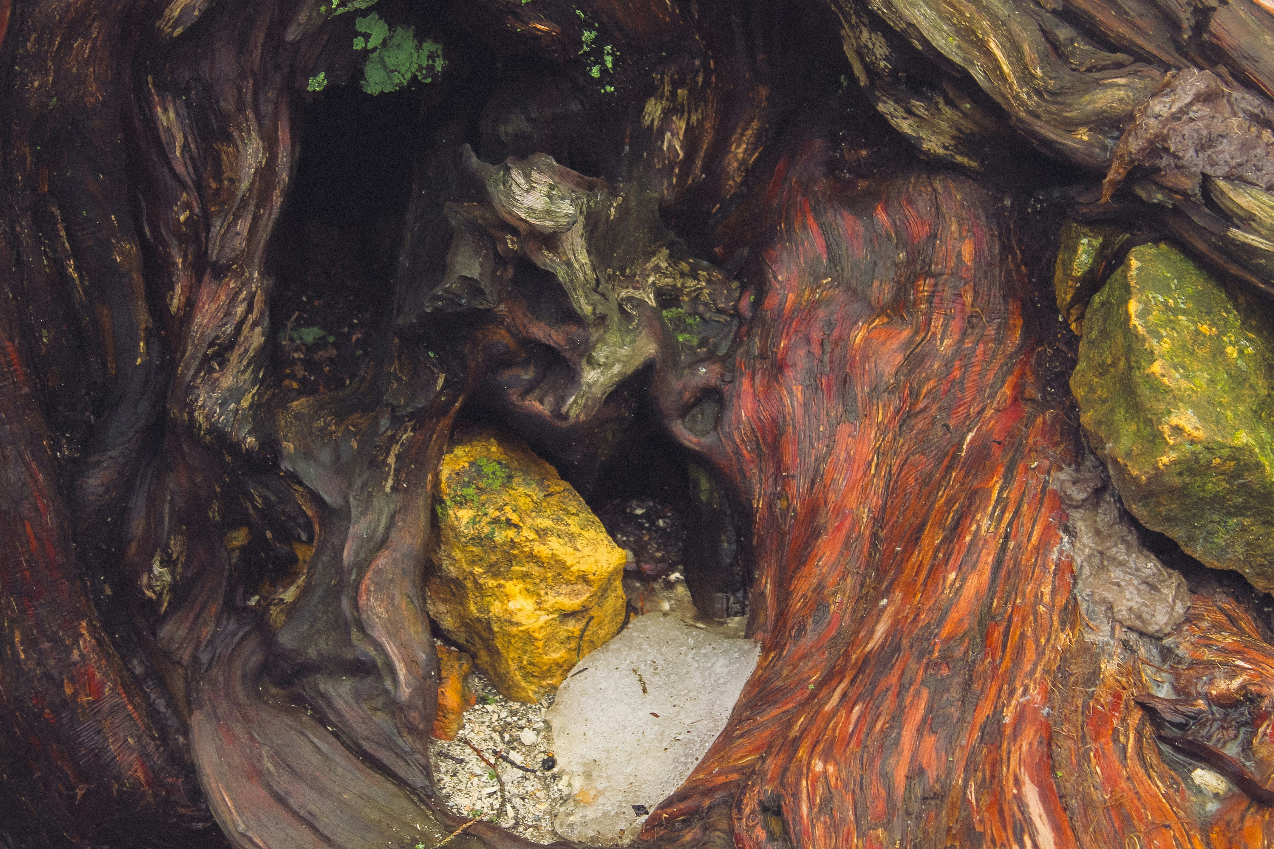 Rough-Walled Nook: A Small Stone Nestled in Volcanic Hues
