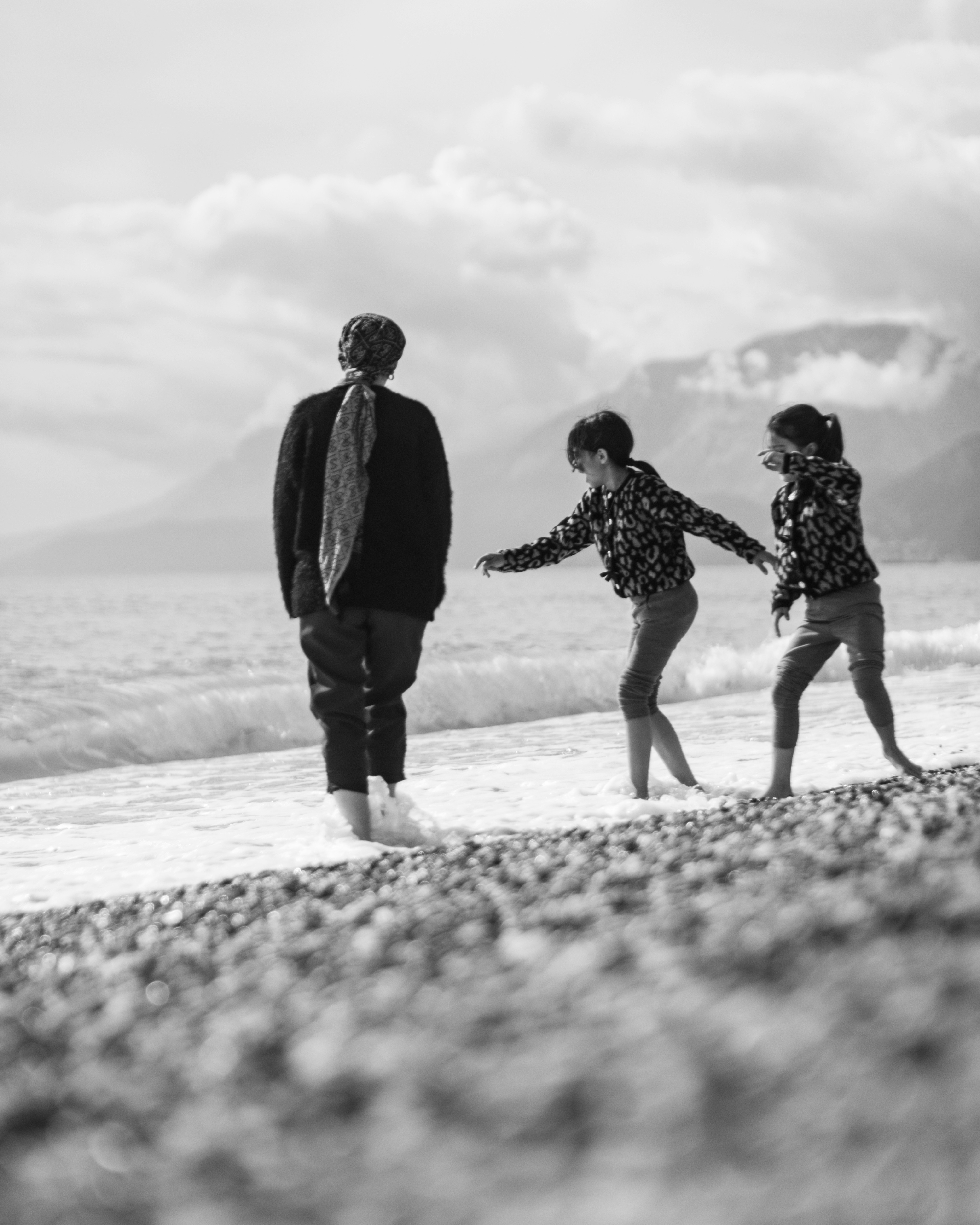 Three Figures on a Wind-Swept Shore