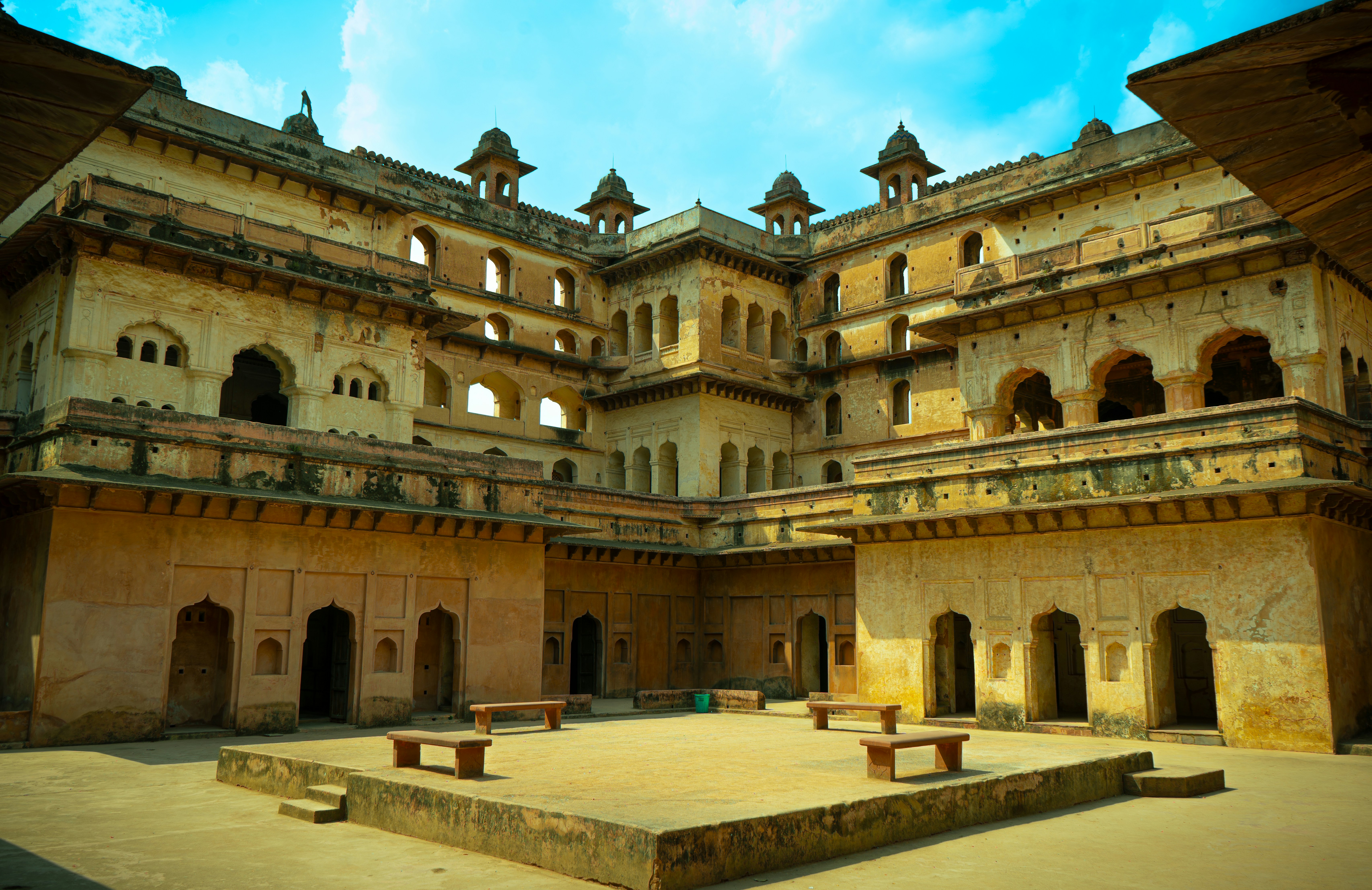 Sunlit Rajput Courtyard: Echoes of Stone and Sky