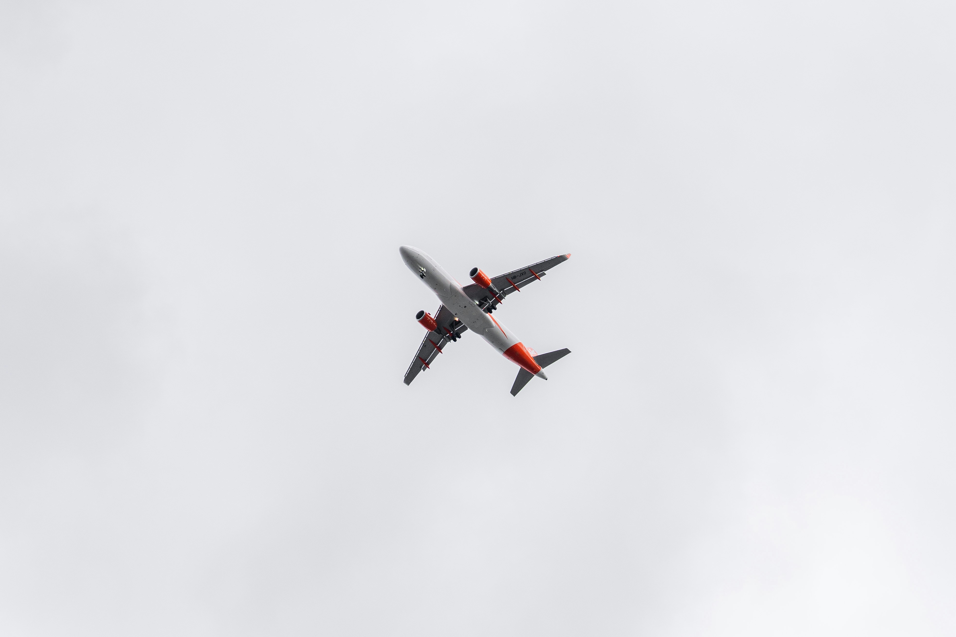 Red-tipped Aircraft Trimming the Sky