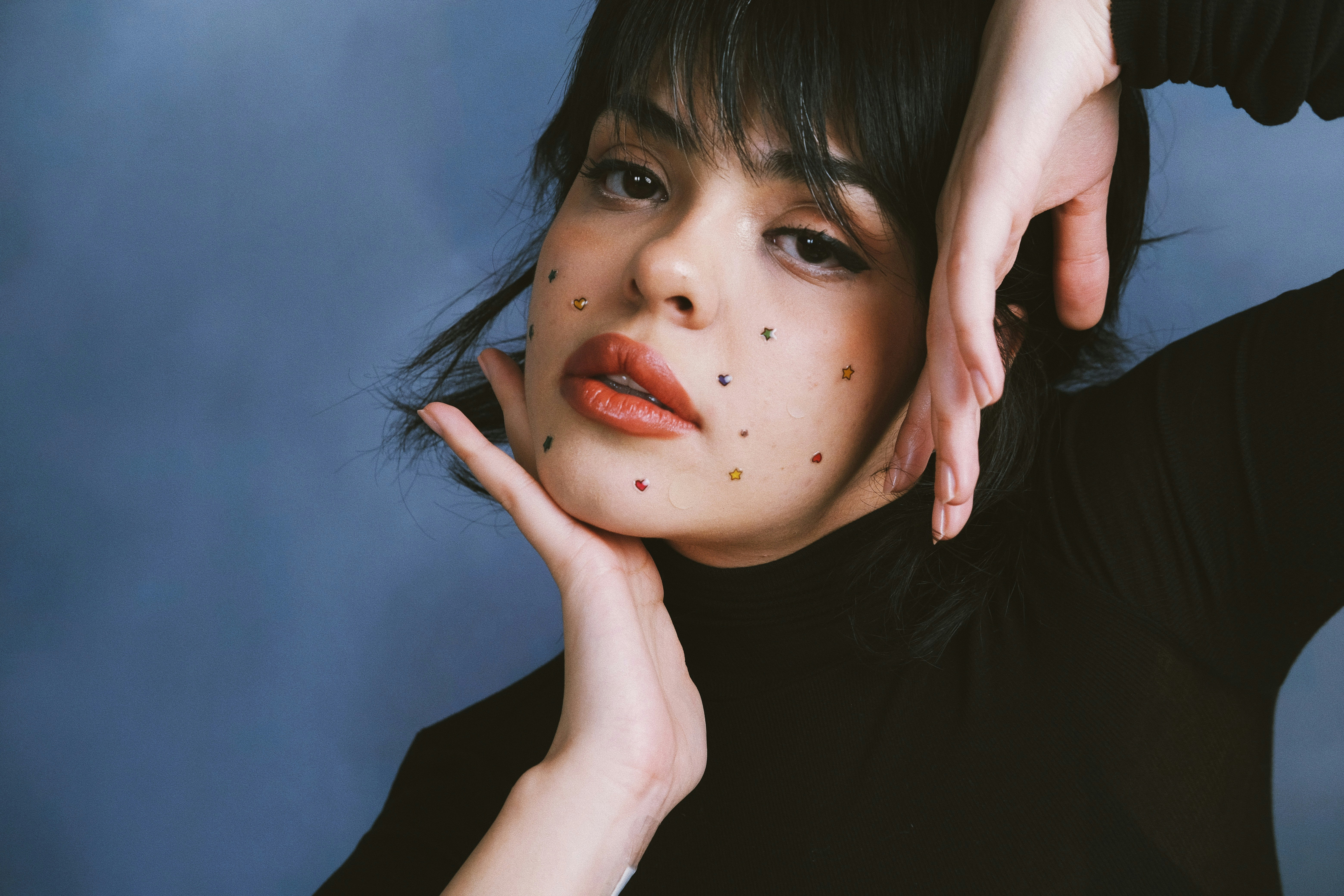 Stitched Gaze: Confident Portrait with Confetti Highlights
