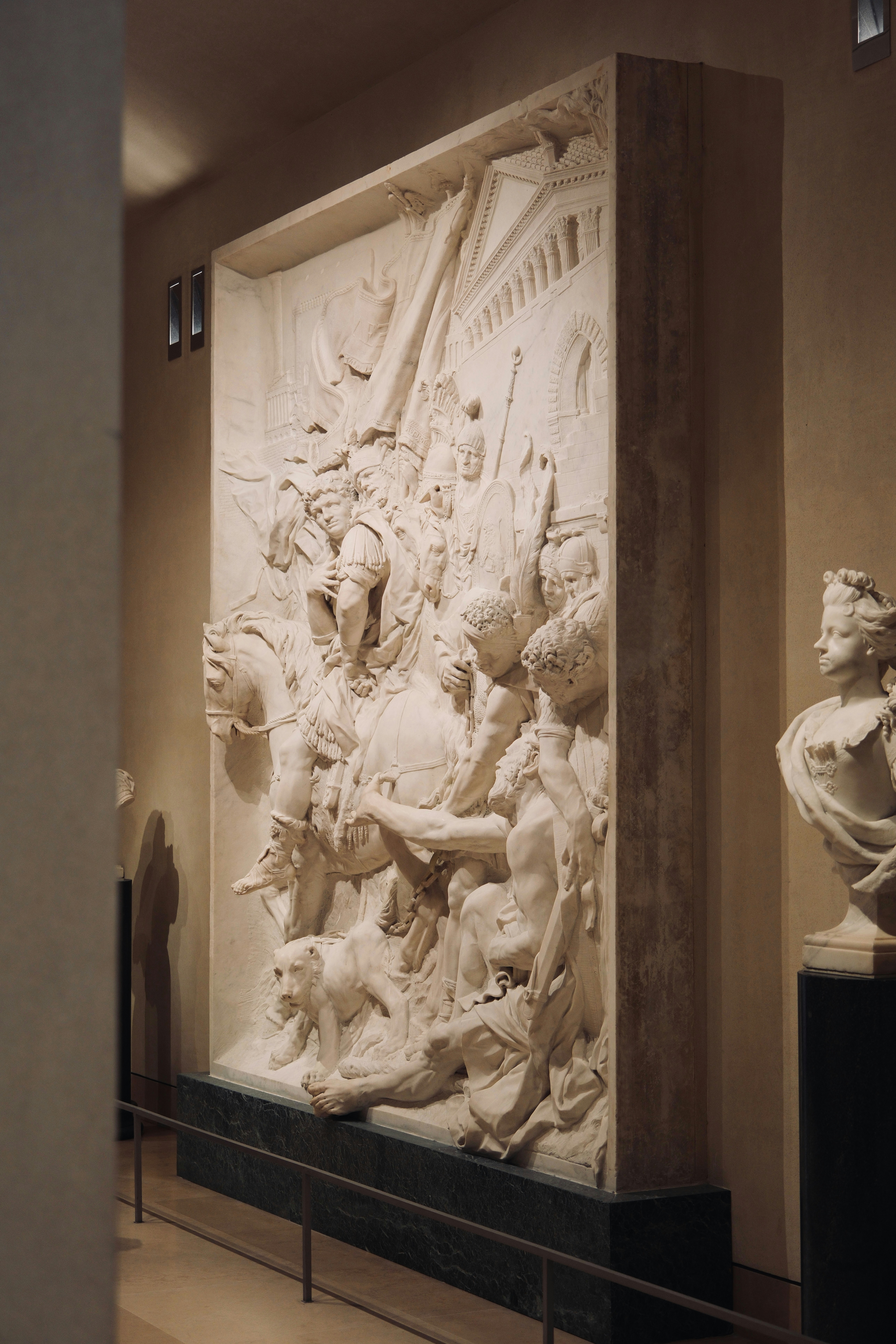 Relief in Marble: A Scene of Historic Detailing Surrounded by Quiet Galleries