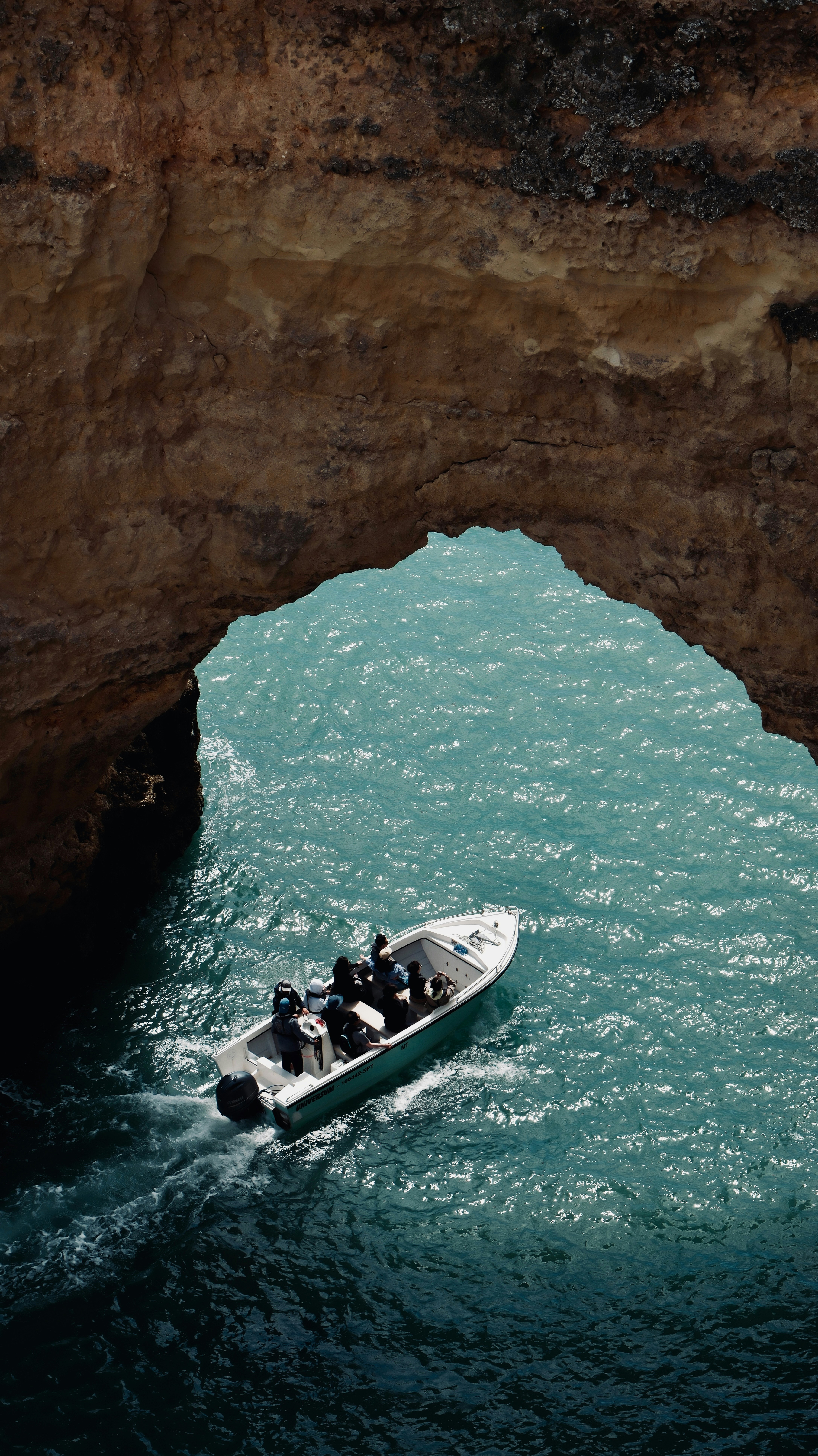 Ocean Gate: A Narrow Boat Treads the Cerulean Cavern