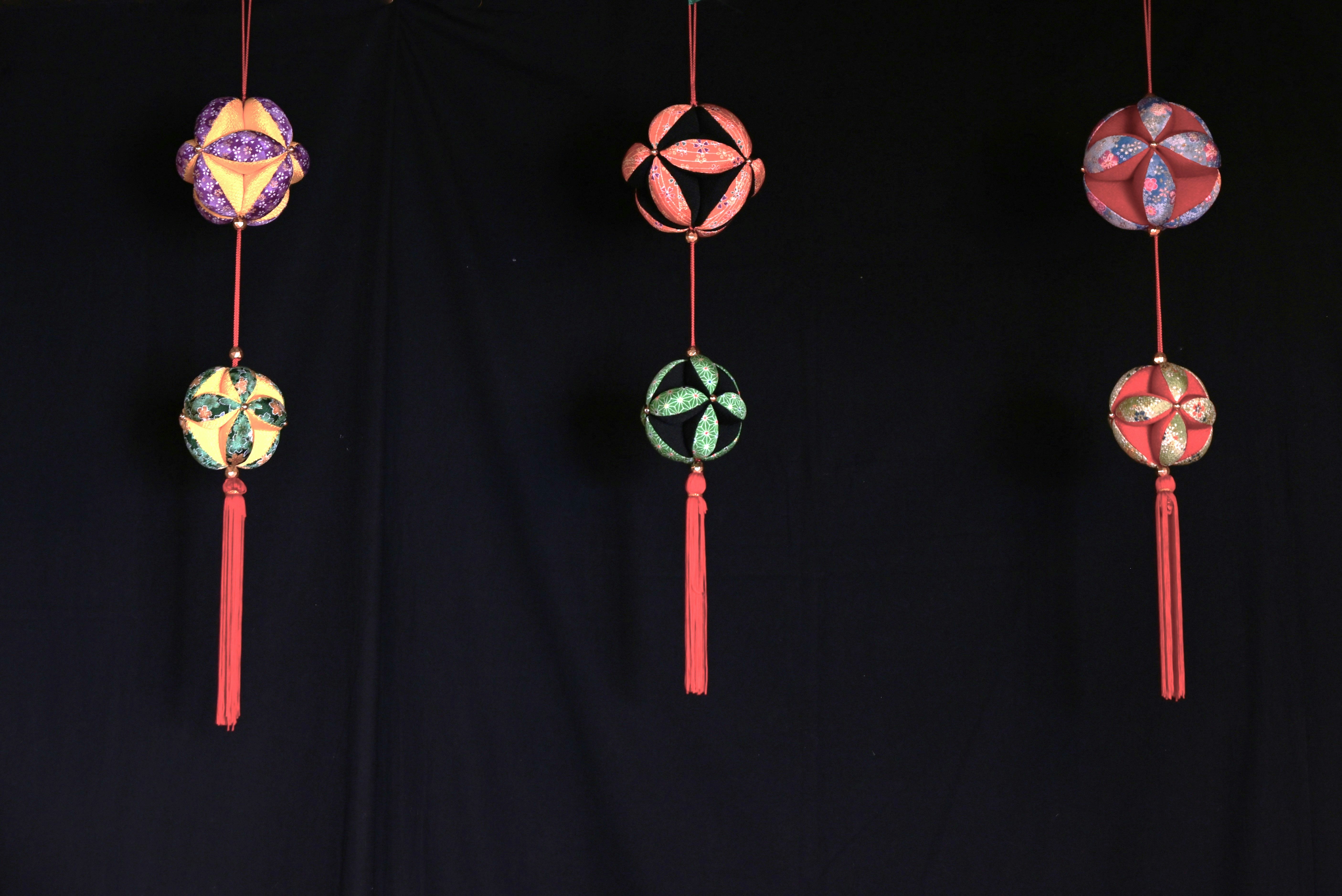 Three-Tier Lantern Orbs Against a Velvet Night
