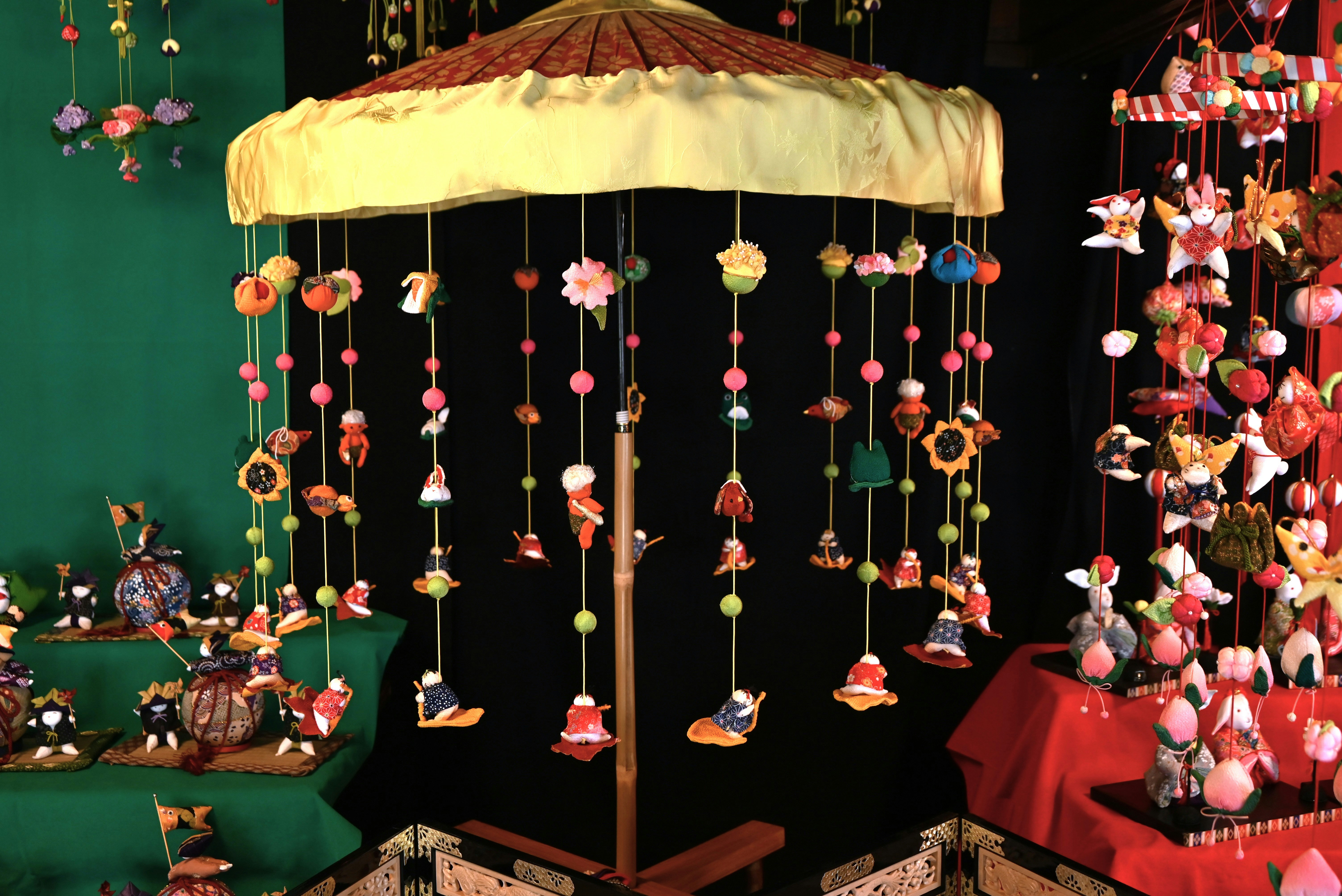 Hanging Ornament Carousel: Delicately Crafted Charms in a Cozy Booth