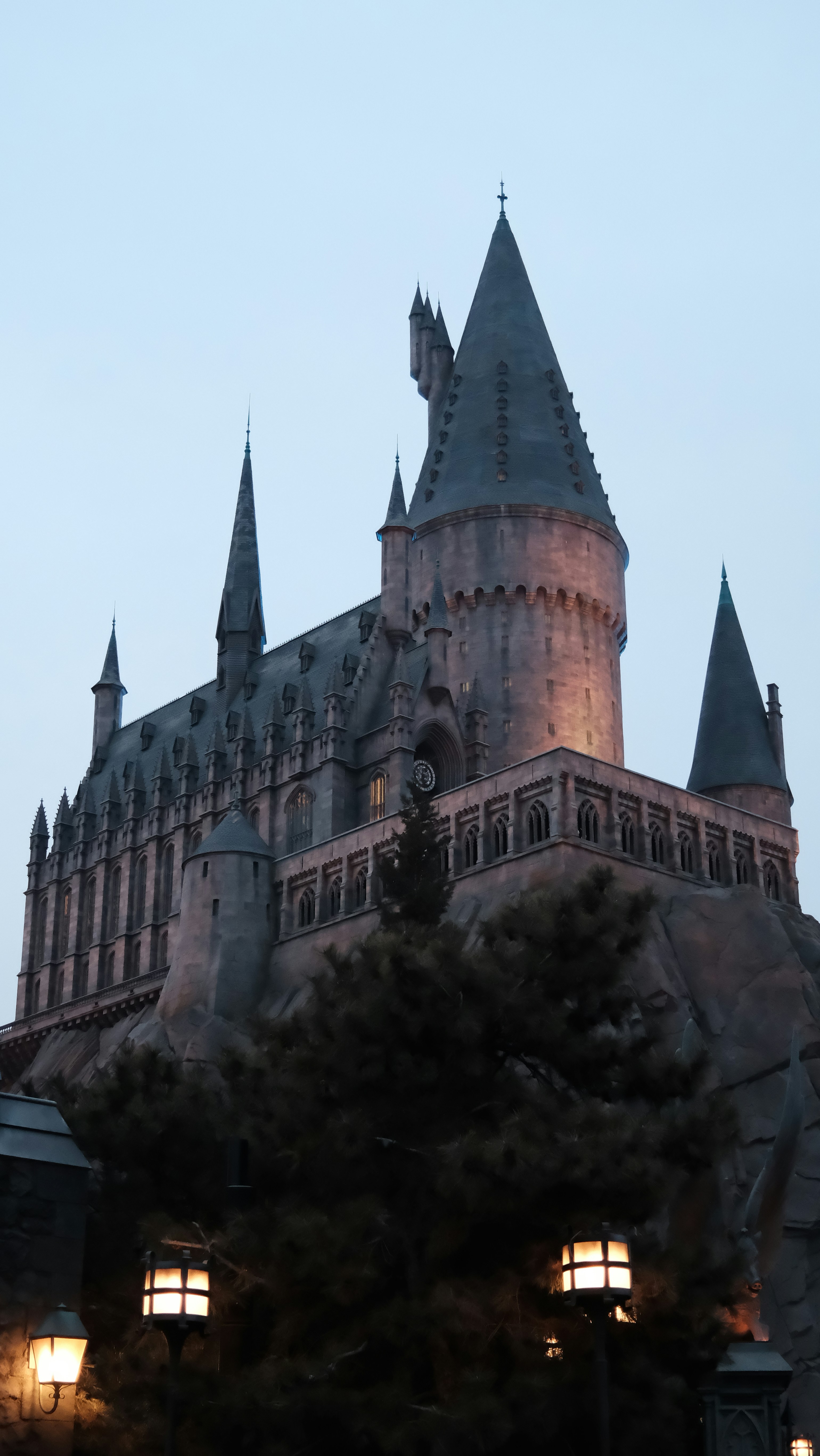 Evening Crown: A Central Keep Rising Above Twilight Trees