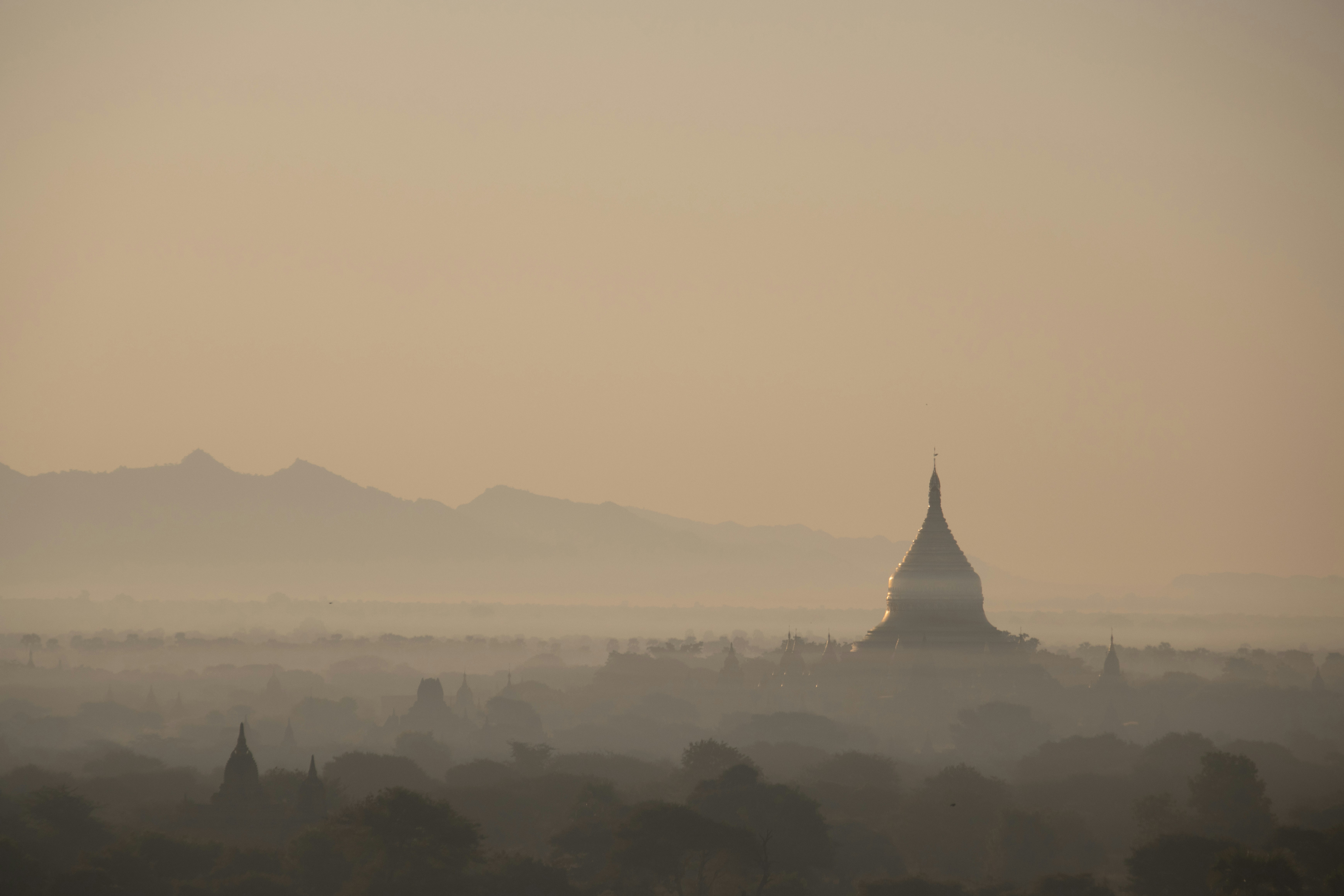 Distant Pagoda Silhouette at Dawn