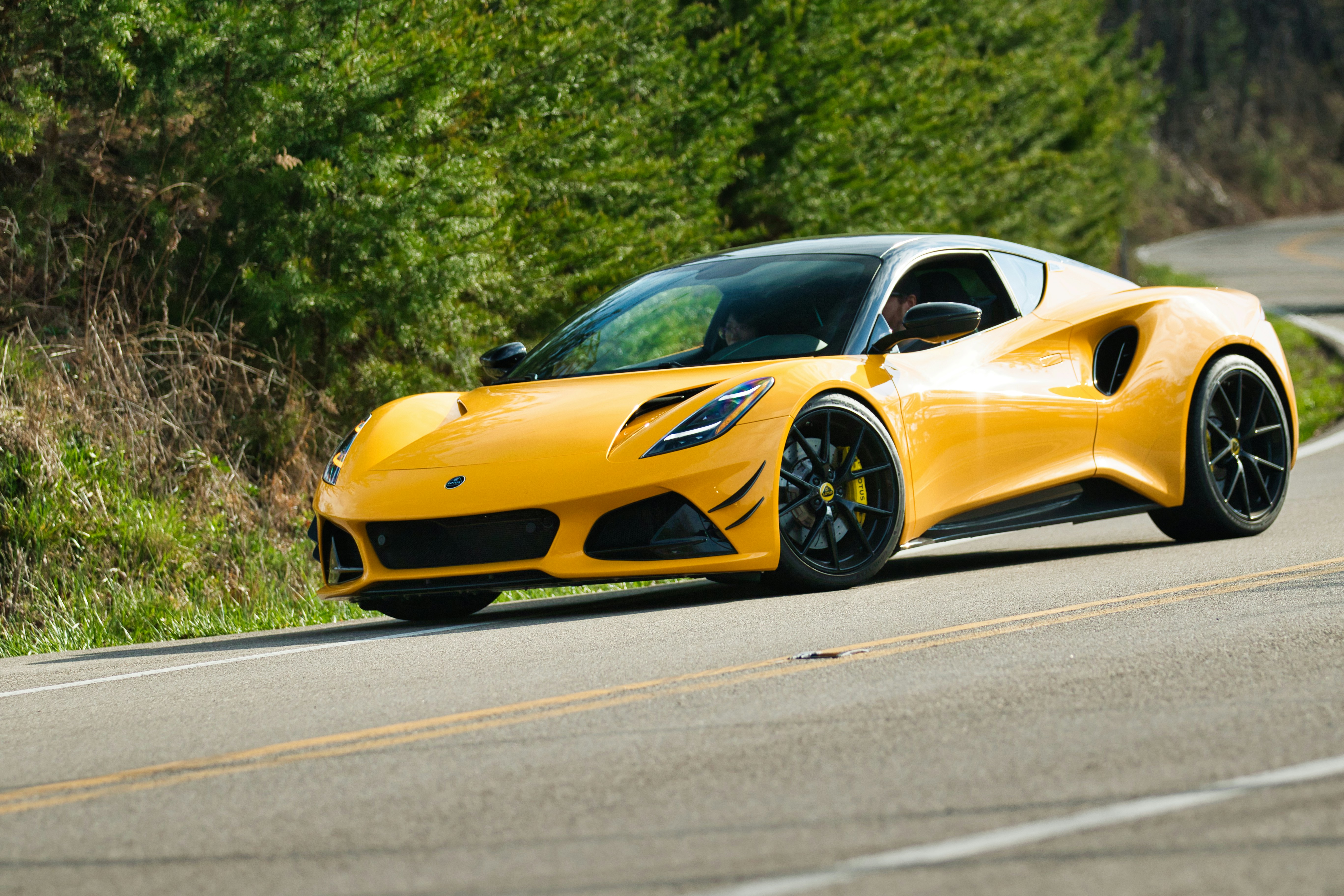 Golden Apex: Yellow Ferrari Breaching the Coastal Road