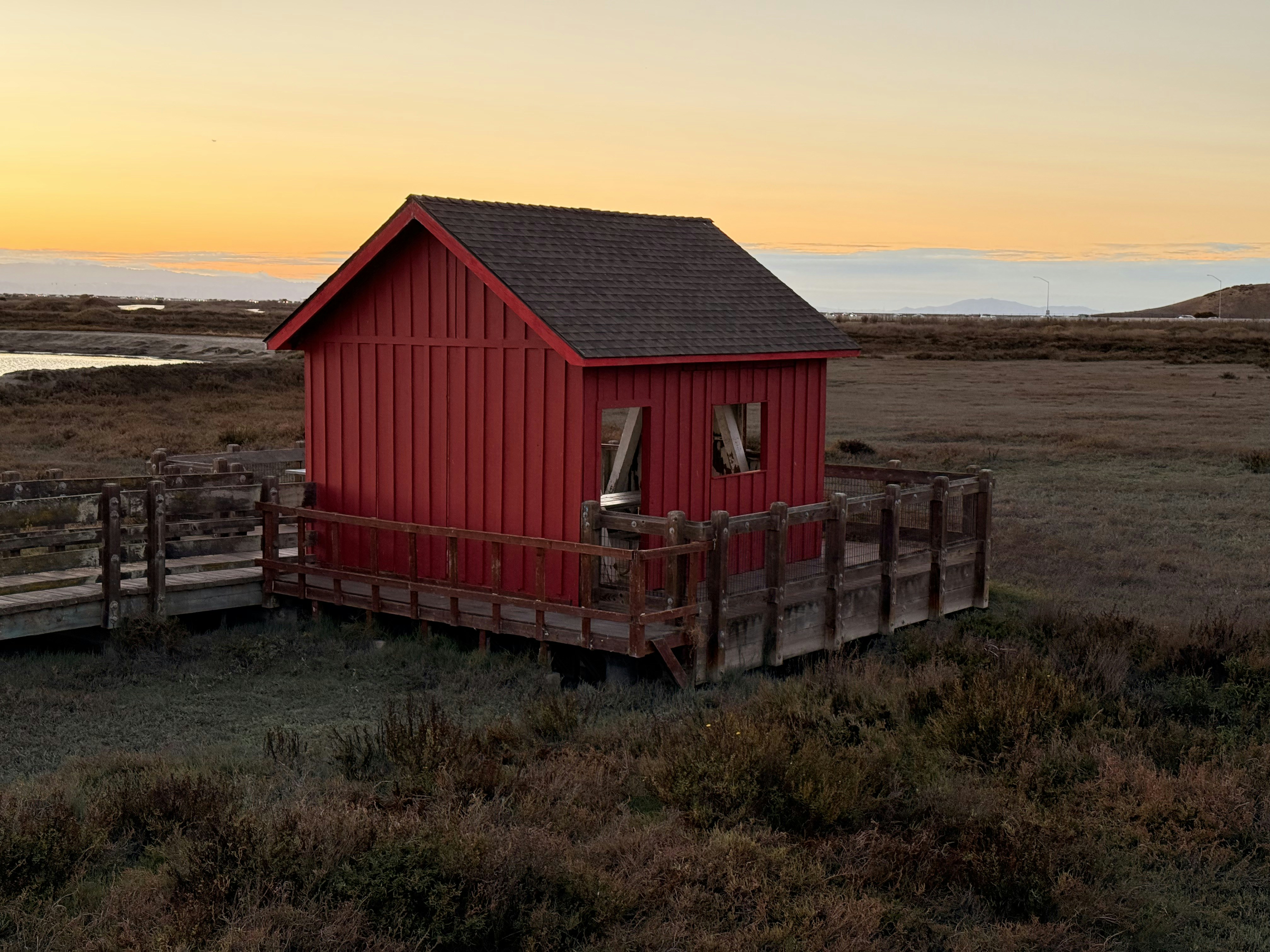 Red Cabin on a Sunset Plank Walk