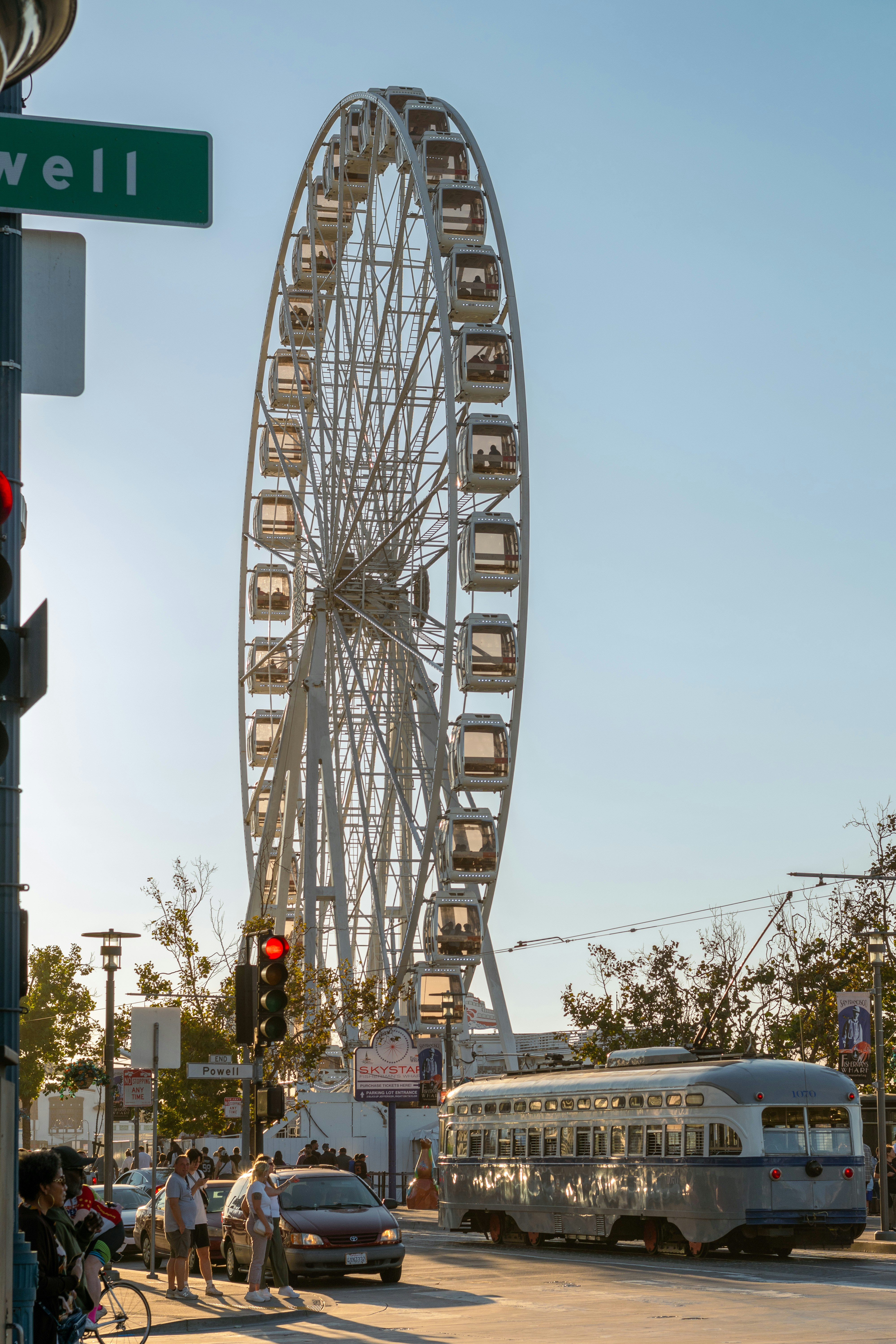 Giant Ferris Wheel at Dawn: City Intersections and Retro Bus