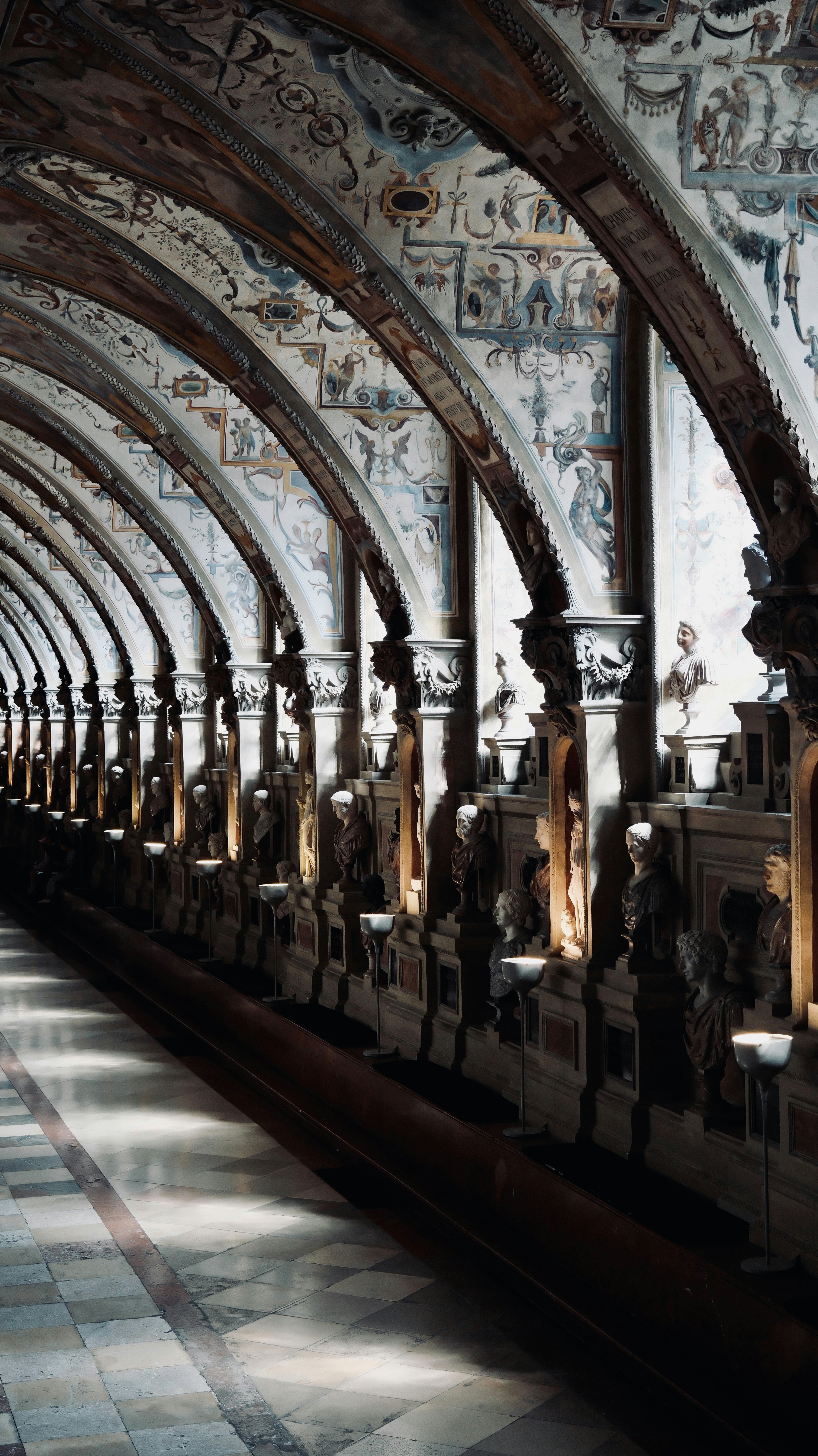 Echoes of Architecture: Repetition and Light in a Marble Corridor