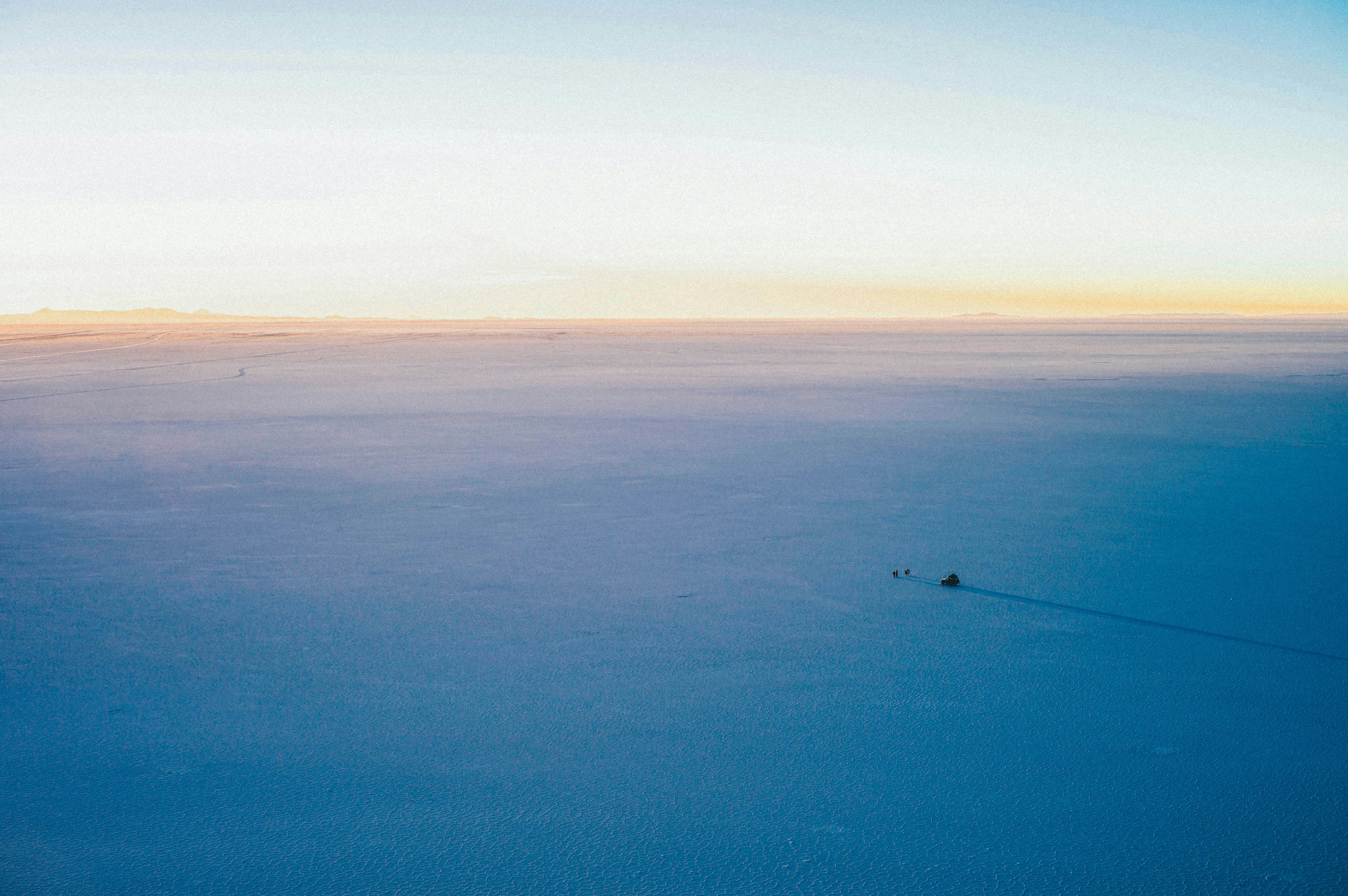 Whispering Horizon: A Golden Edge Above a Polar Sea