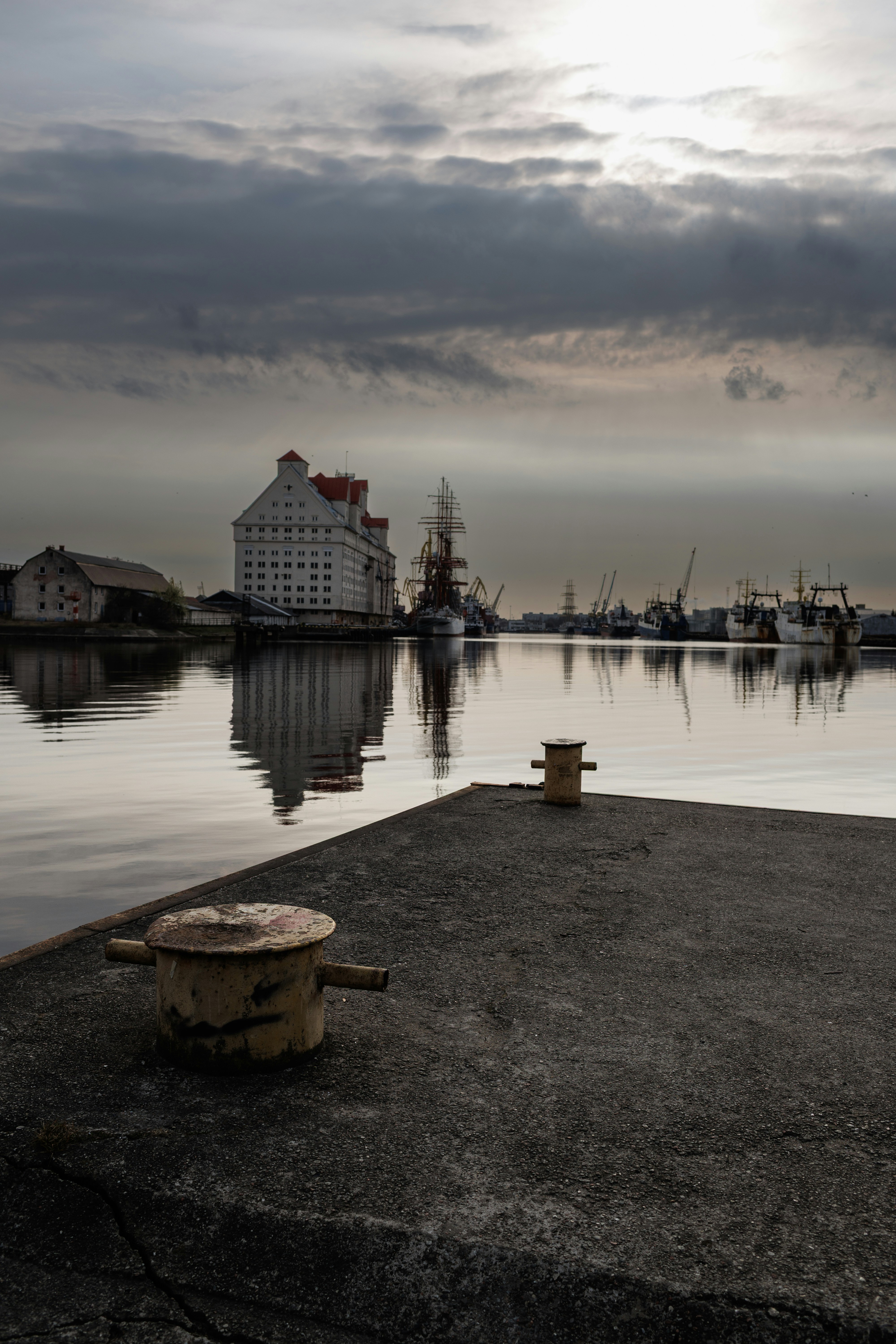 Harbor at Dusk: Reflections and Rain-Soft Skies