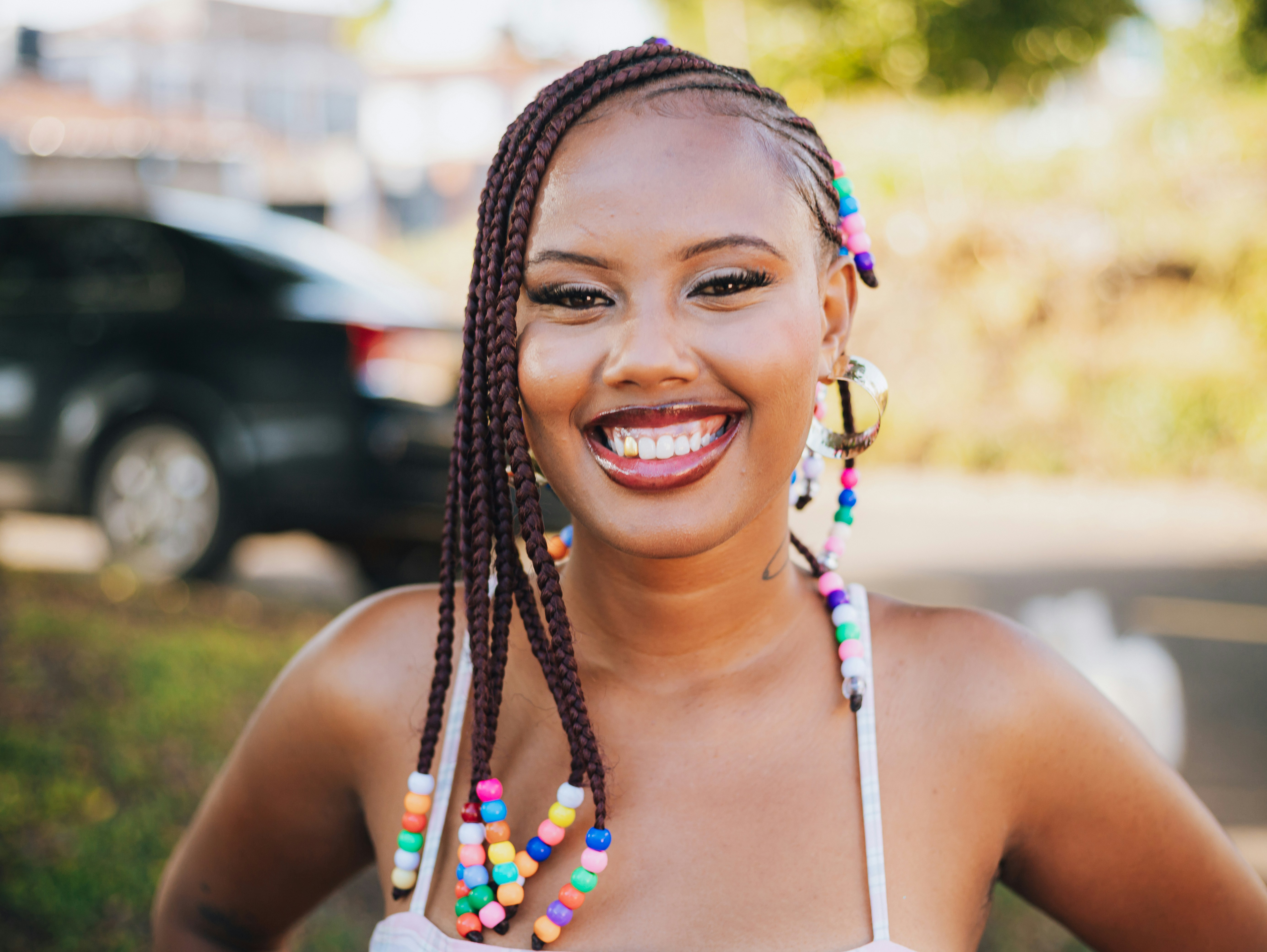 Bright Smile, Brighter Beads: A Portrait of Joy