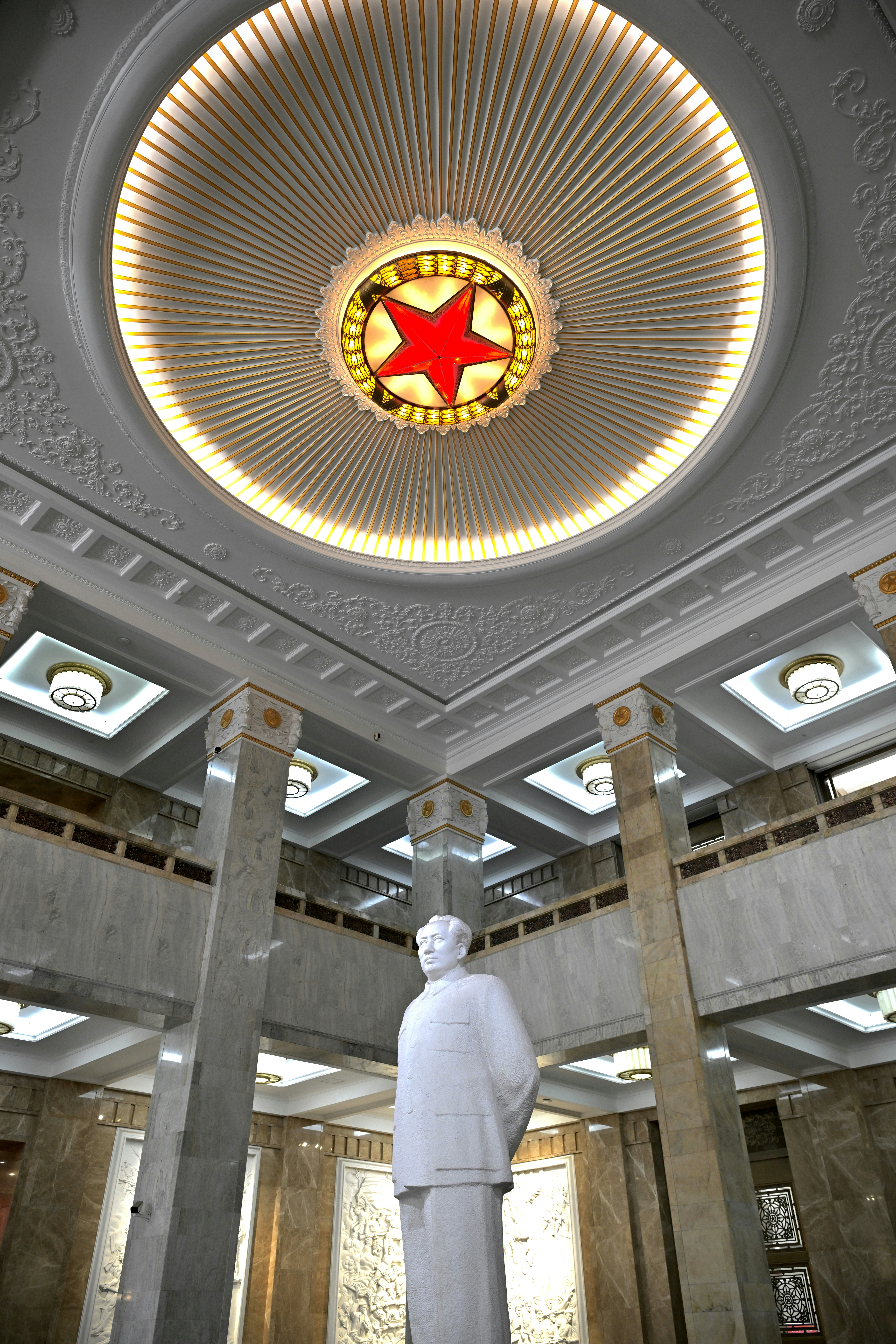 Ceiling Radiance: A Hall of Marble and a Red Star Cloaked in Light