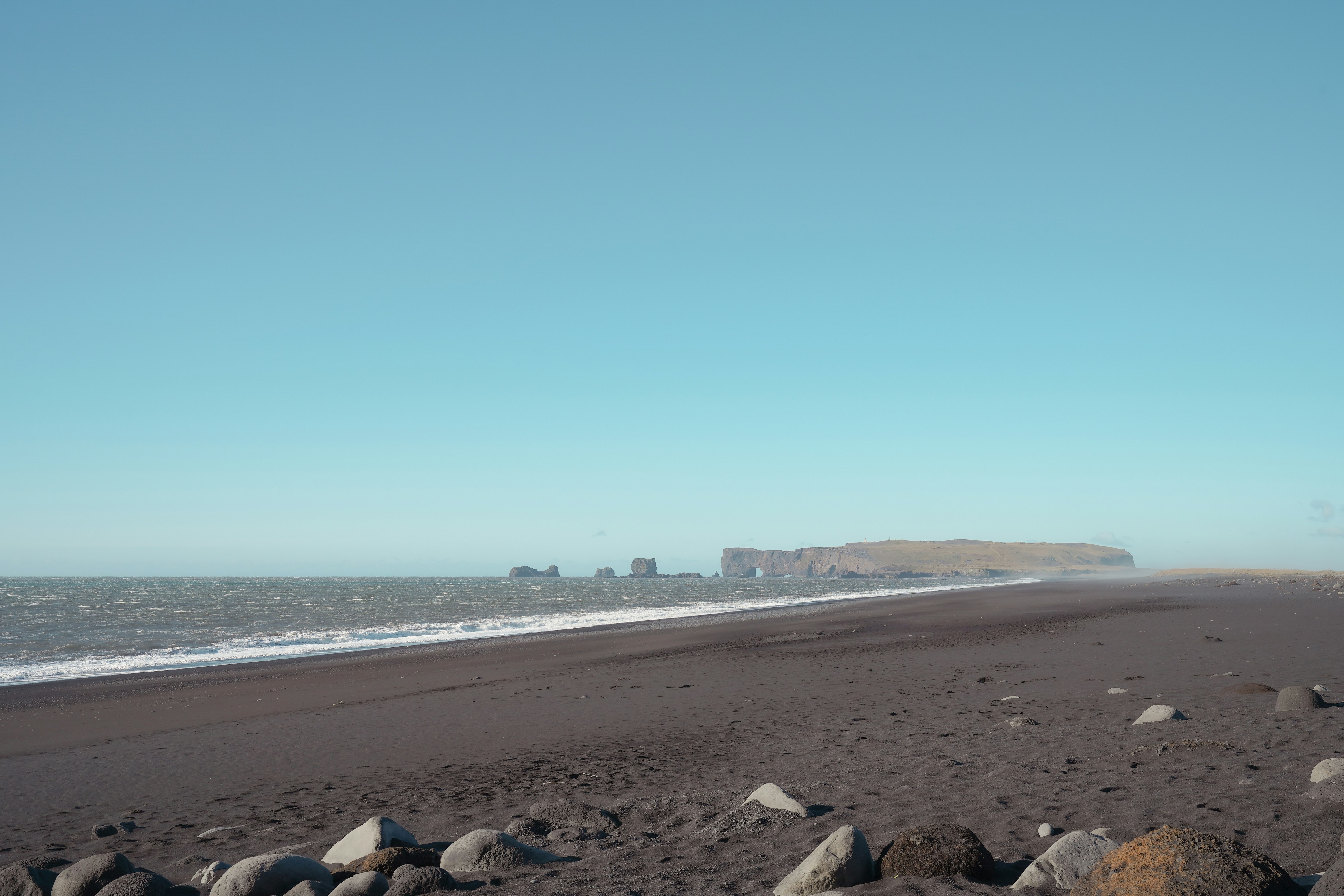 Coastal Plain: A Quiet Beach Meeting the Horizon