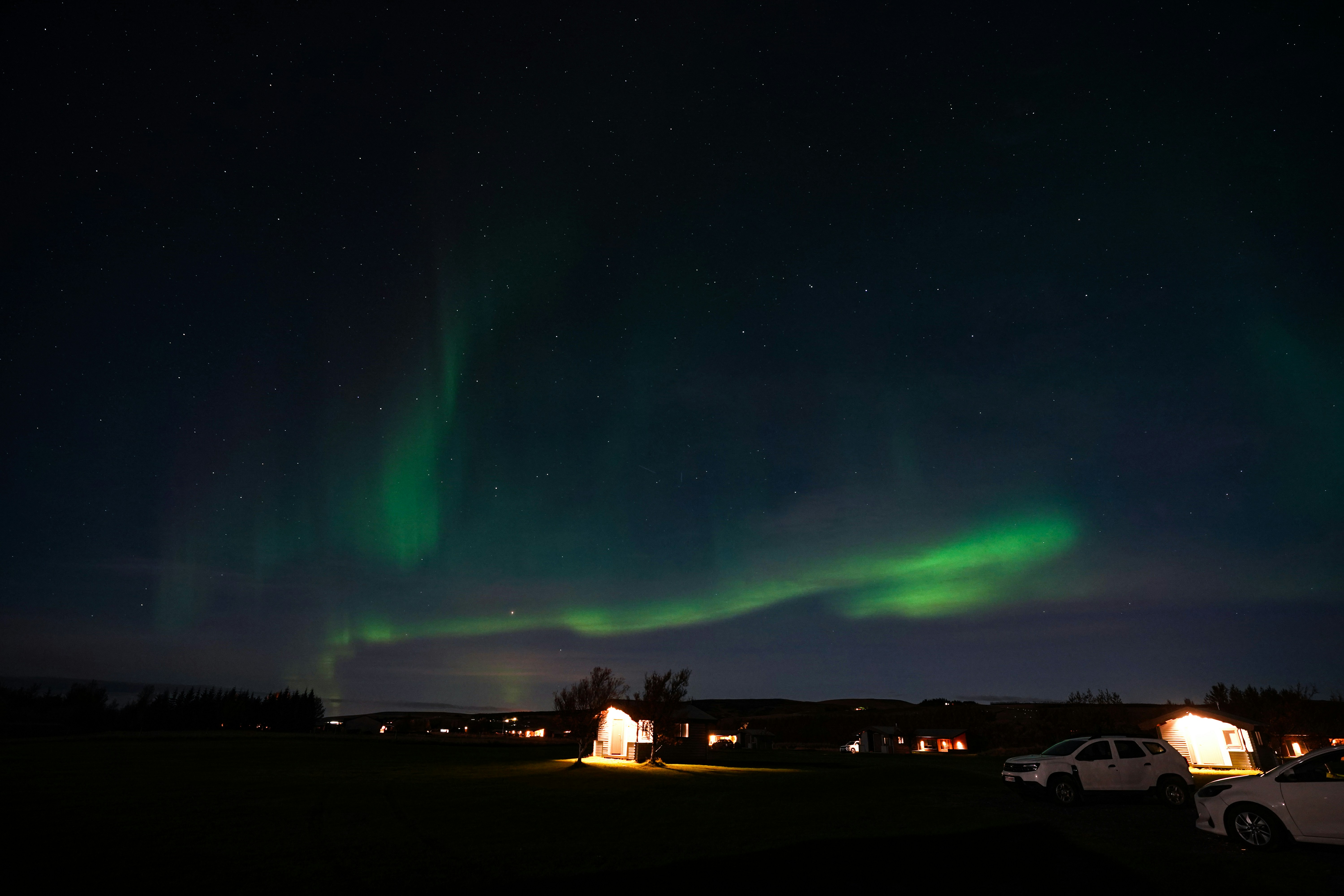 Northern Lights Over a Quiet Field Camping Ground